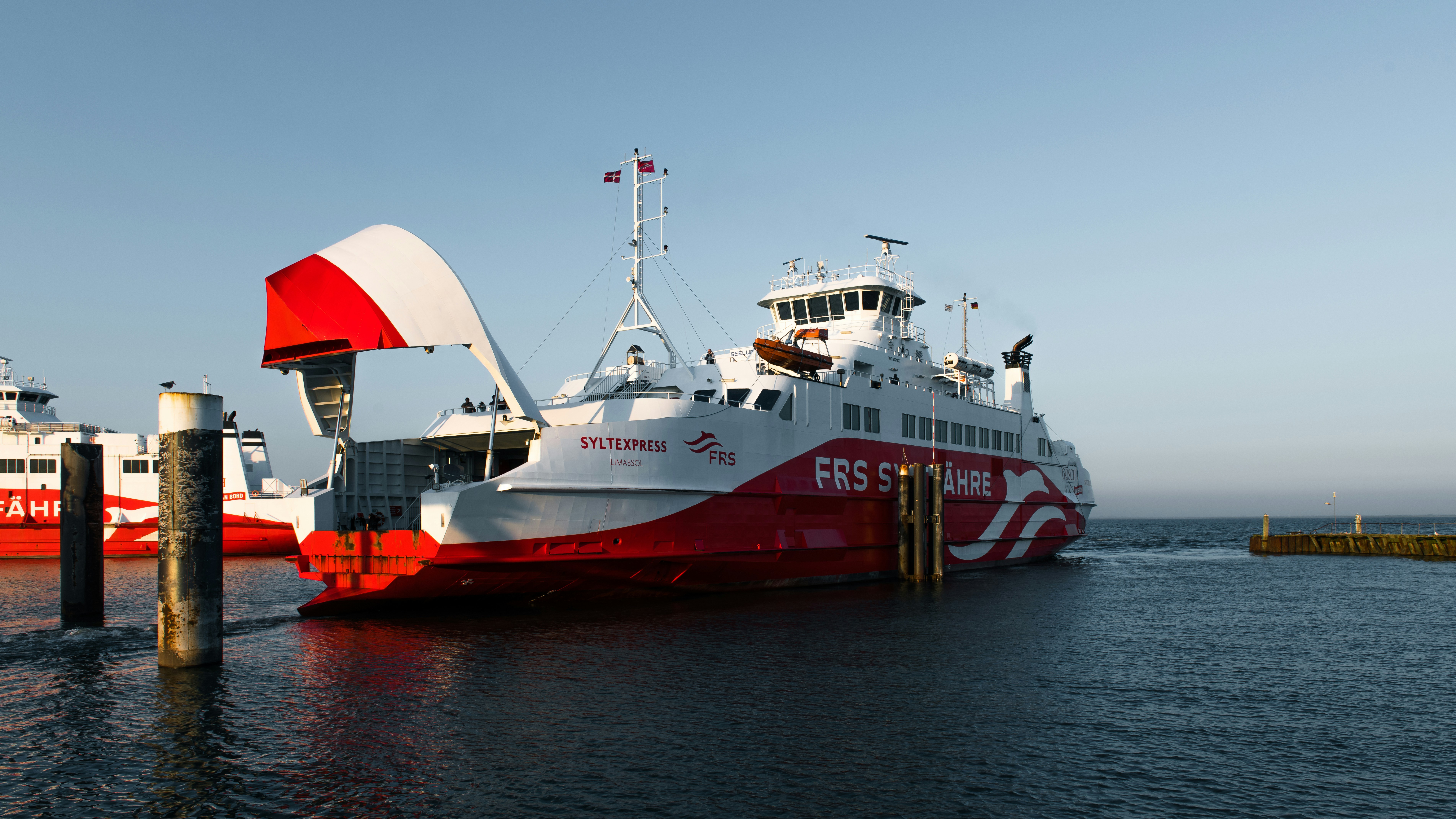 Red Vessel at the Pier: A Harbor Portrait