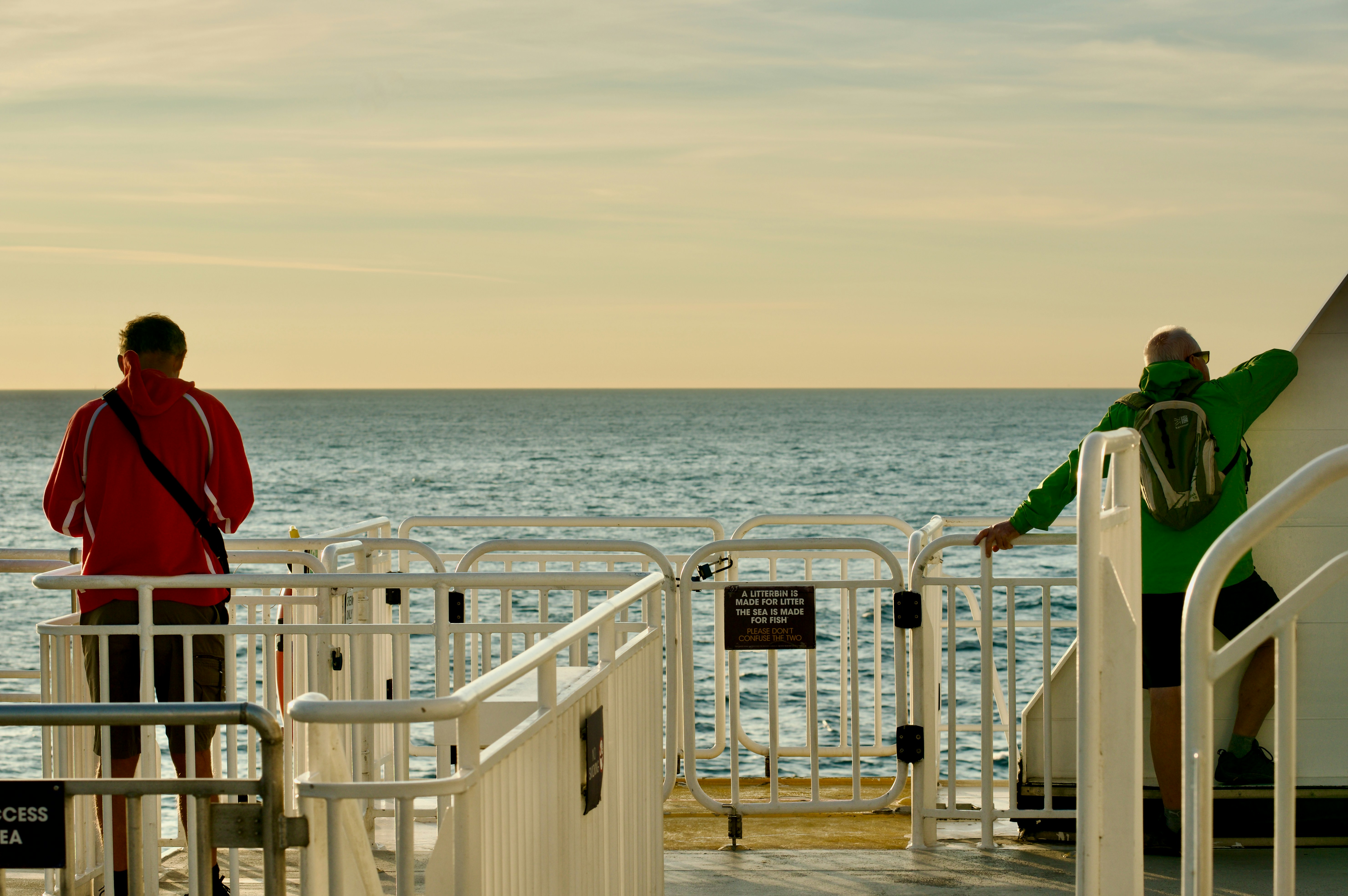 Red-Jacket Sentinel at the Seaside Pier