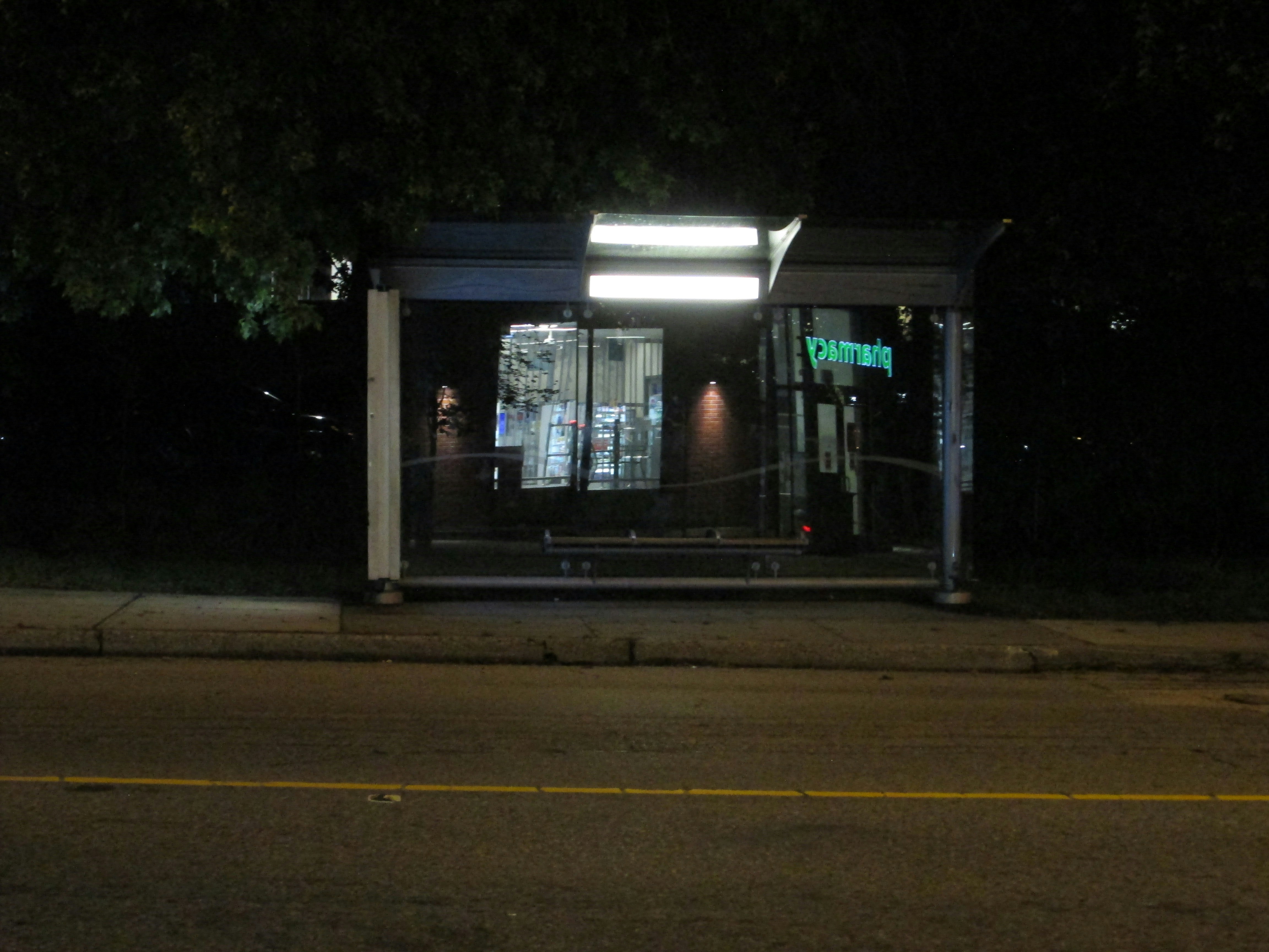 A bus stop sitting on the side of a road photo – Free Vancouver Image ...