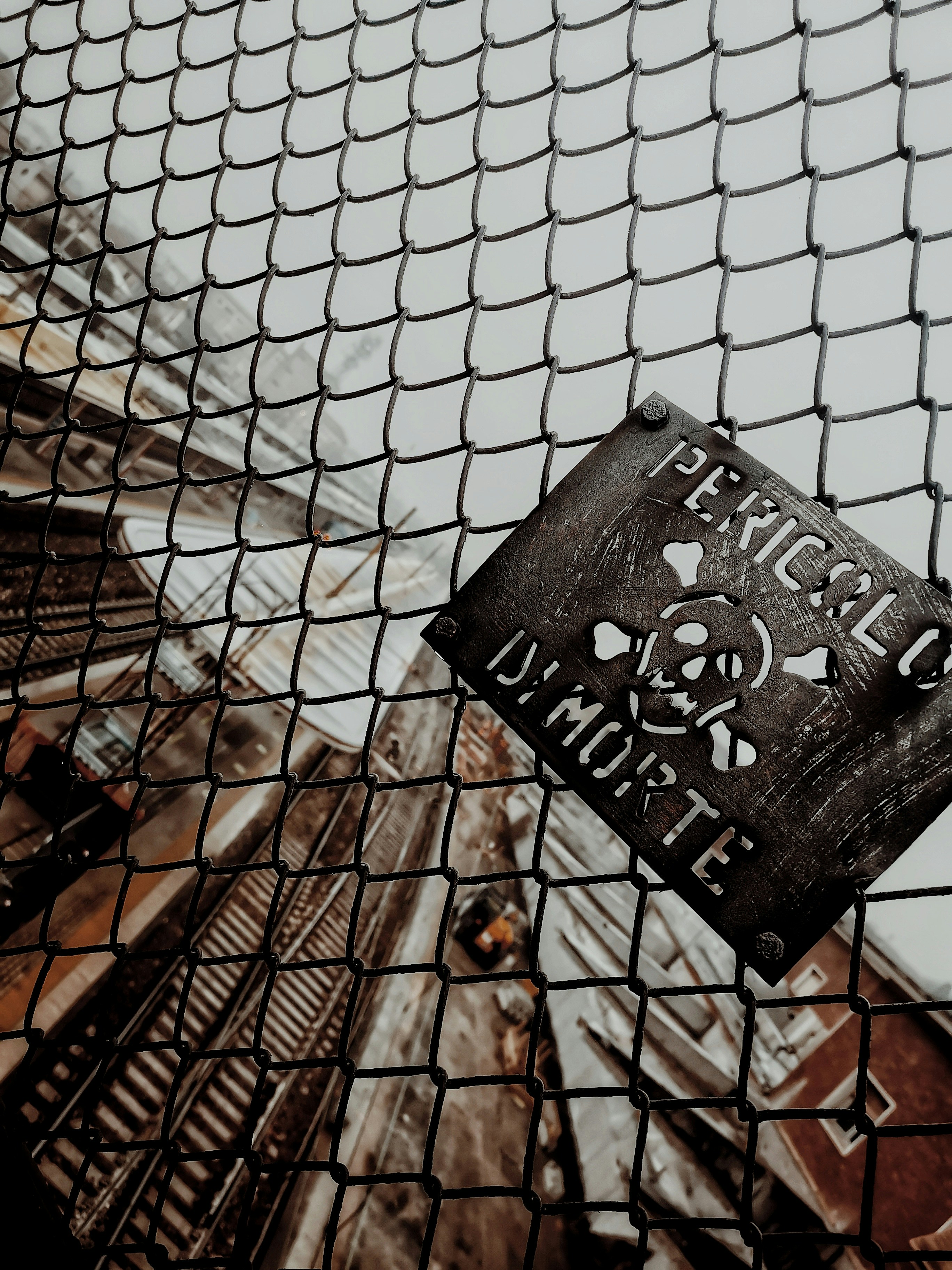 Urban Warning Above the Tracks