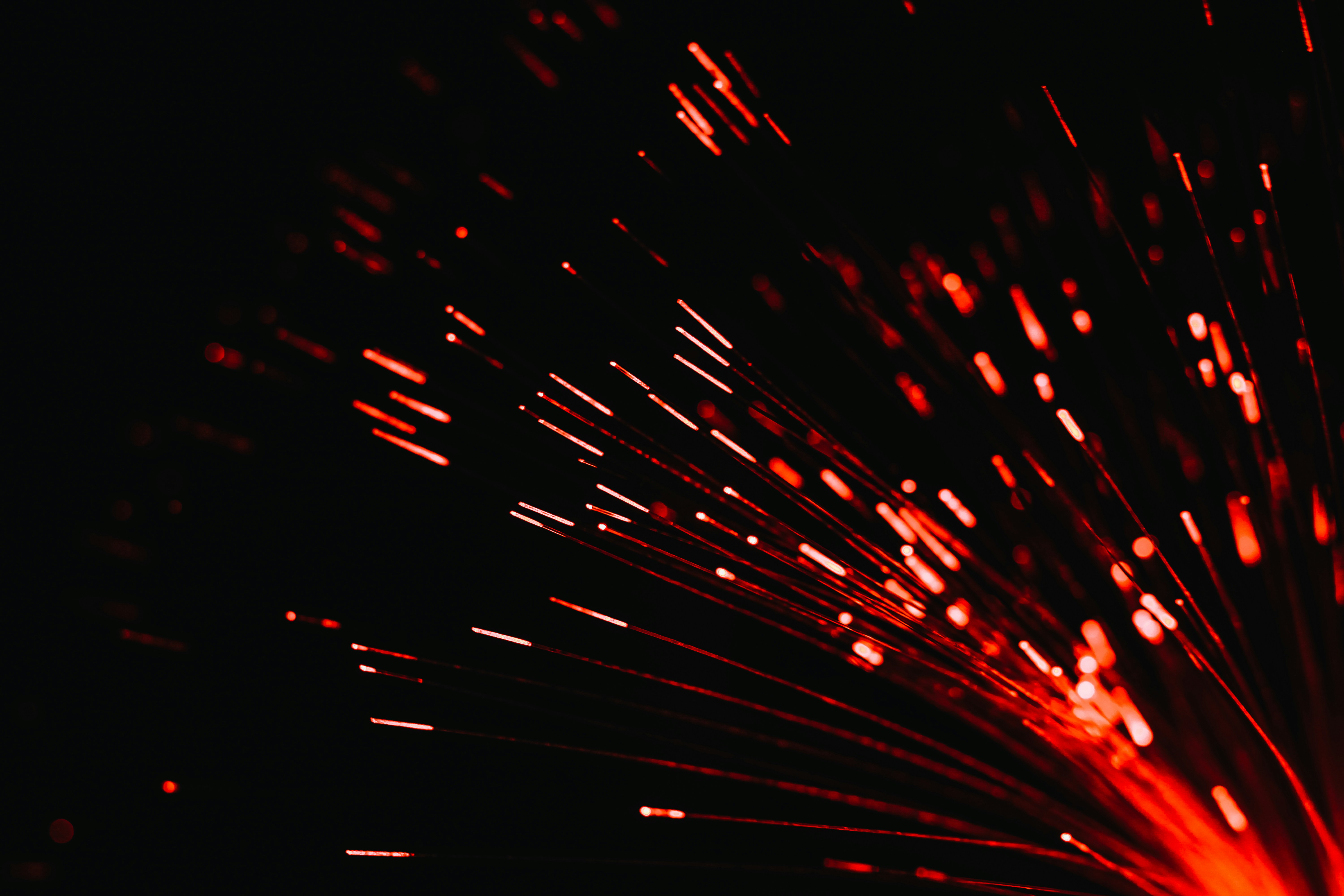 Crimson Spark Cascade at the Edge of Darkness