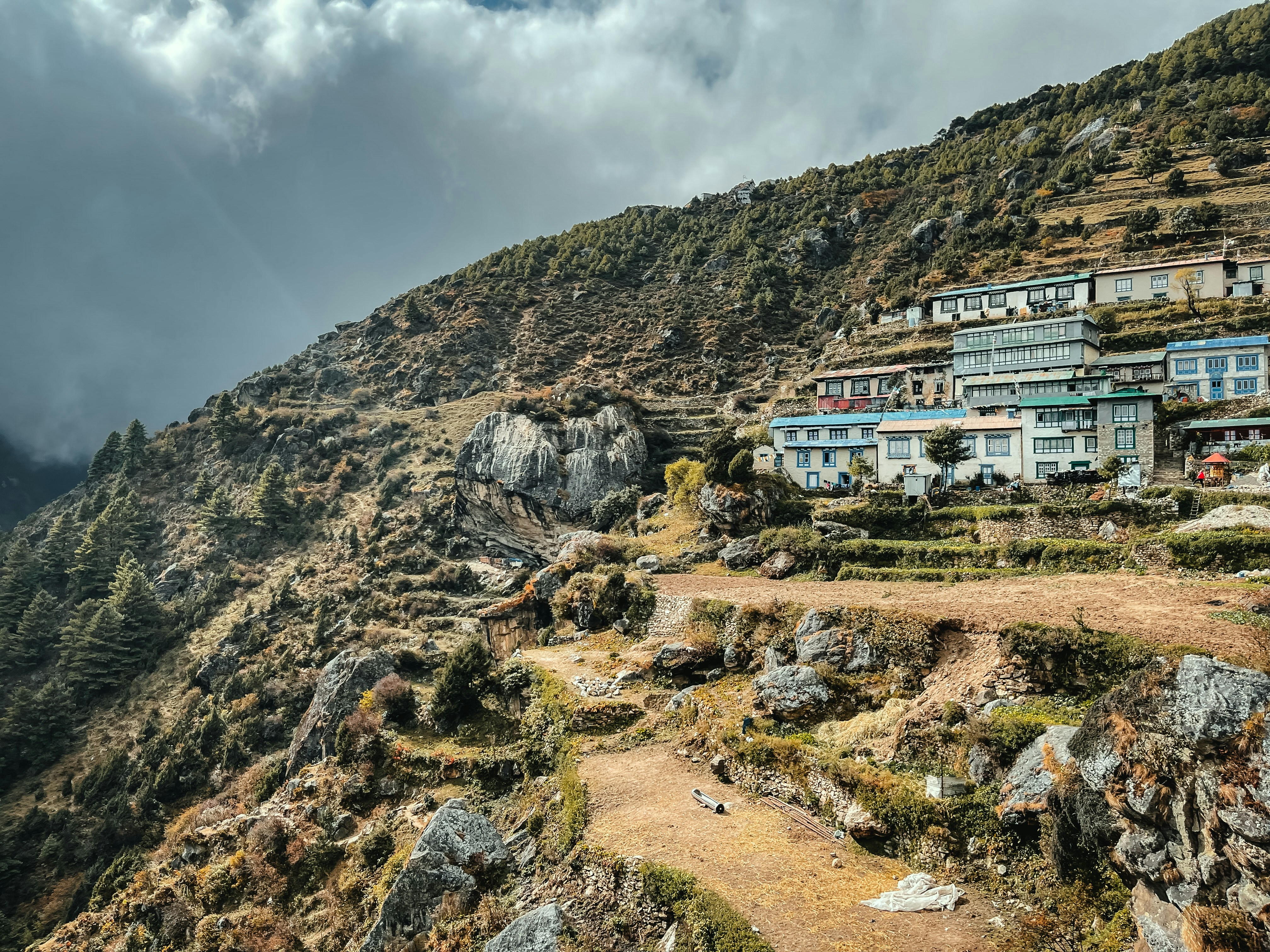 A view of a mountain with a building on top of it photo – Free Urban ...