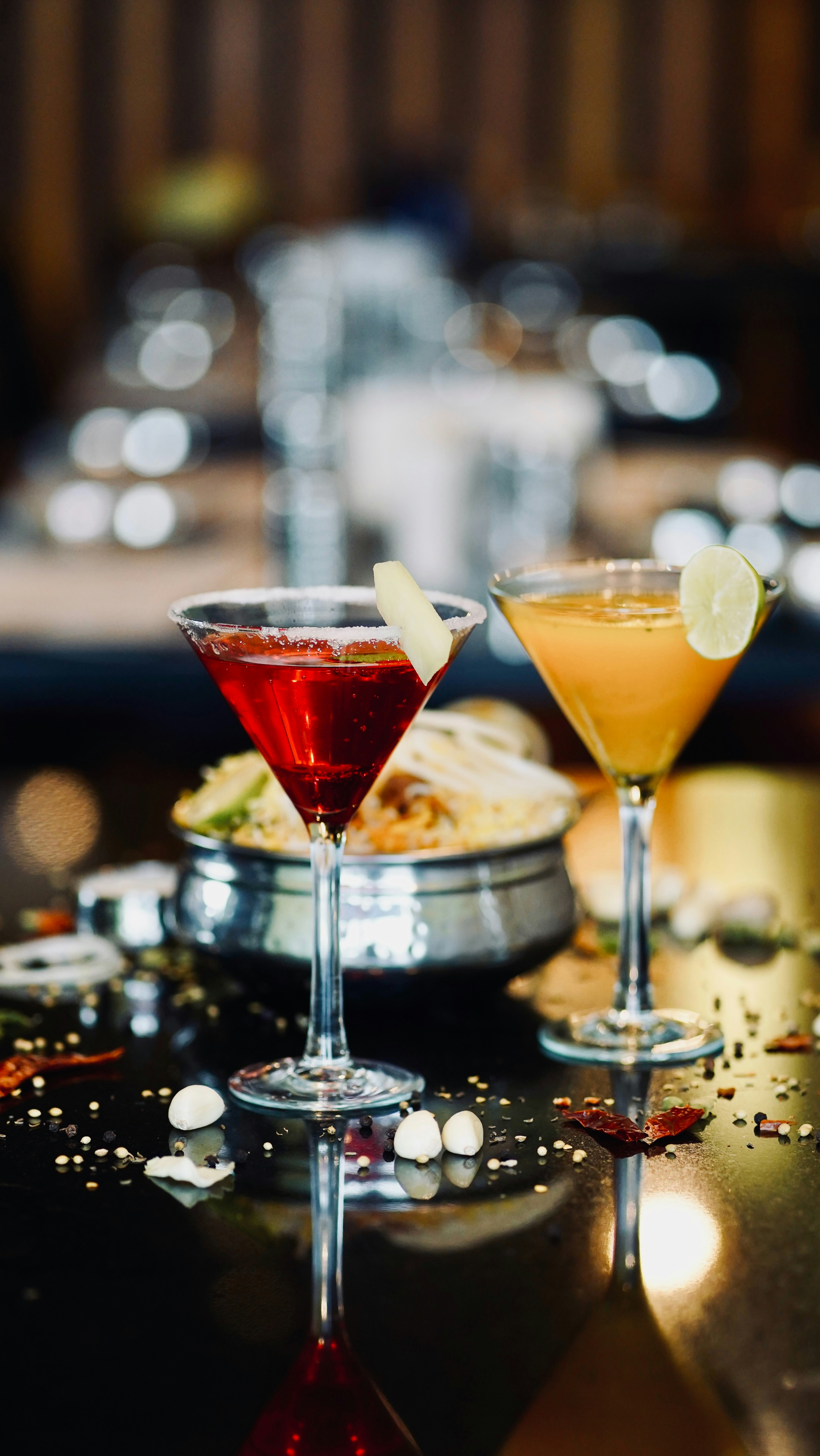 Two martinis sitting on top of a table next to each other photo – Free ...