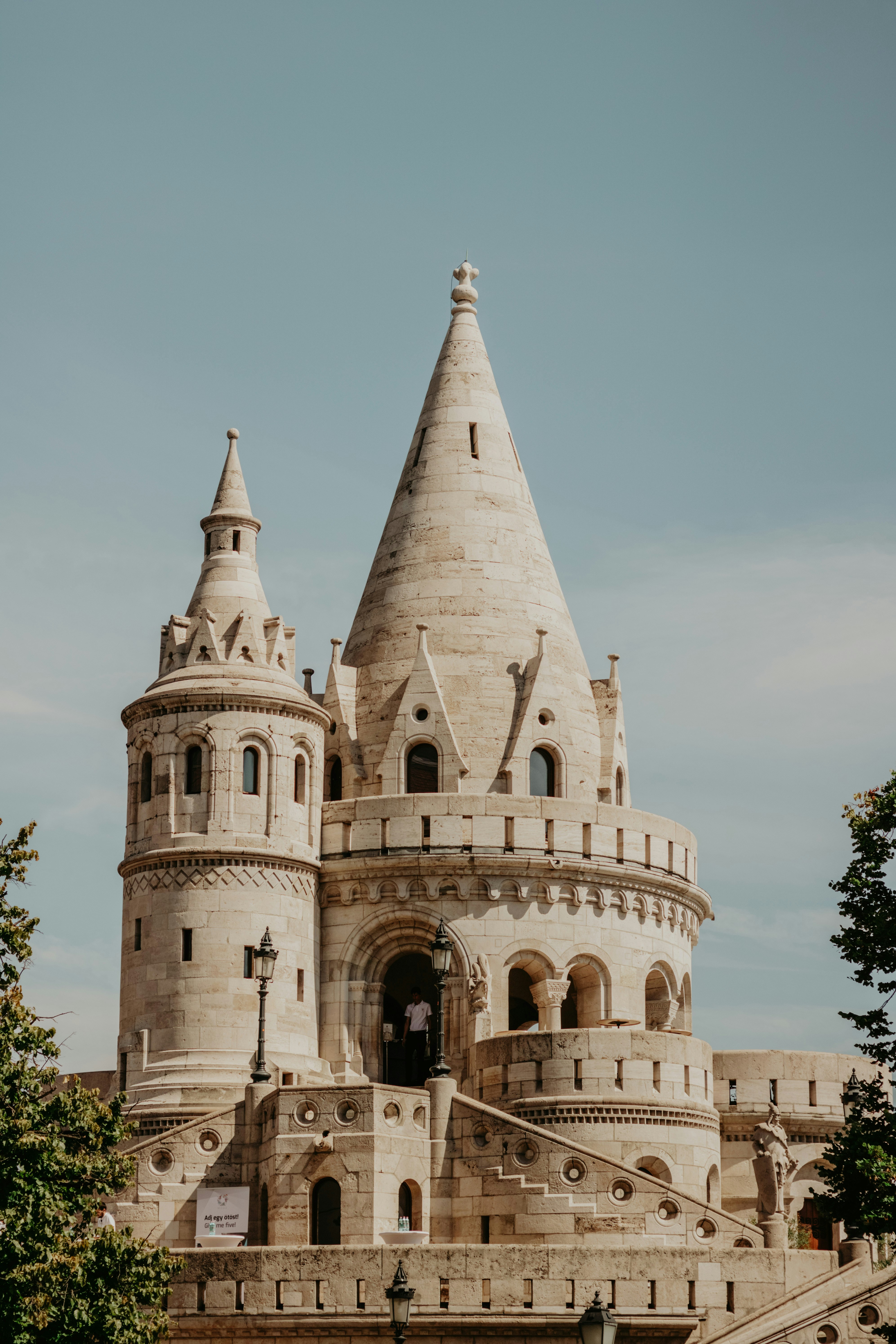 A large castle like building with a clock tower photo – Free Budapest ...