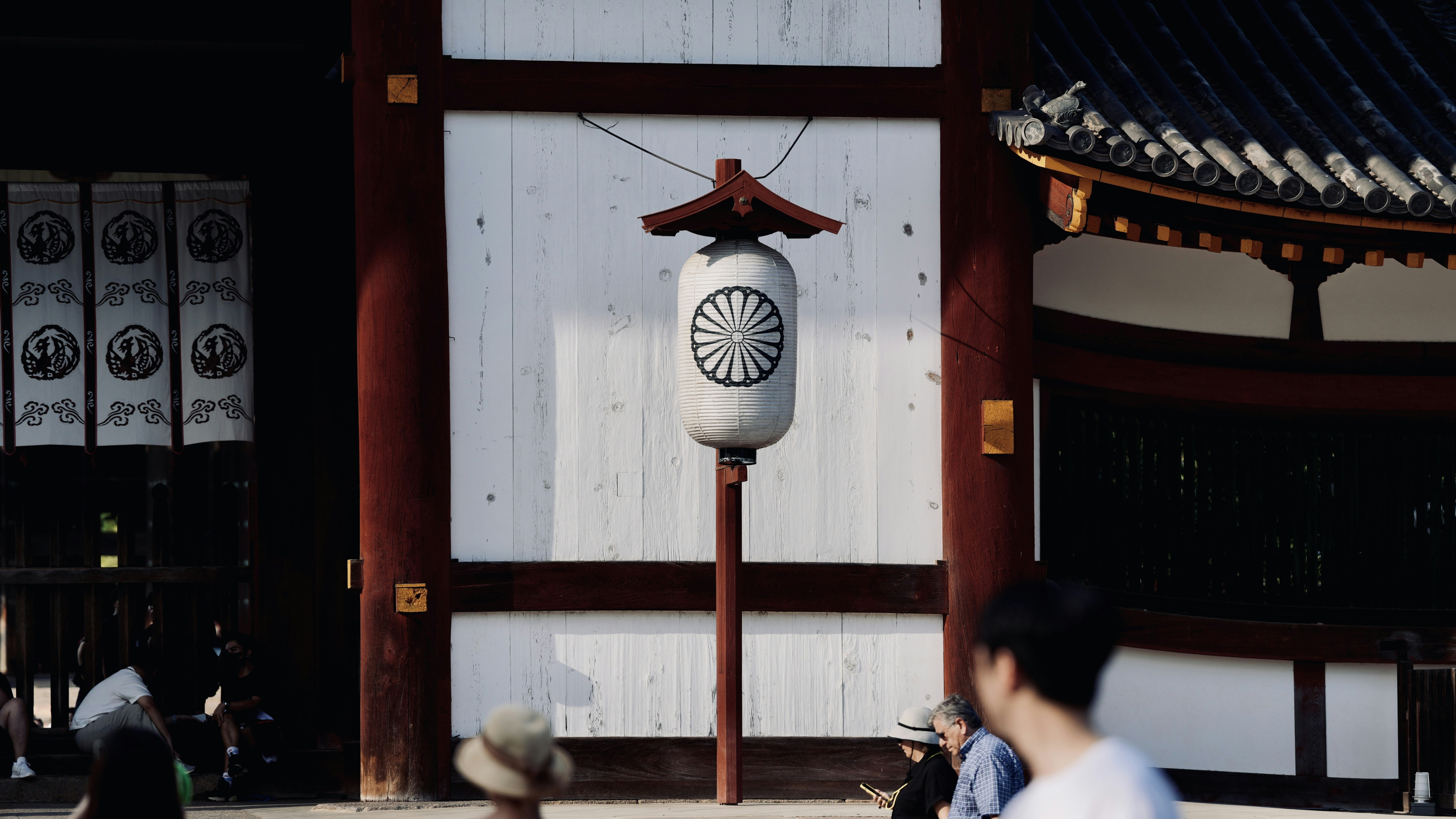 Centered Lantern Framed by Timbered Shrine Walls
