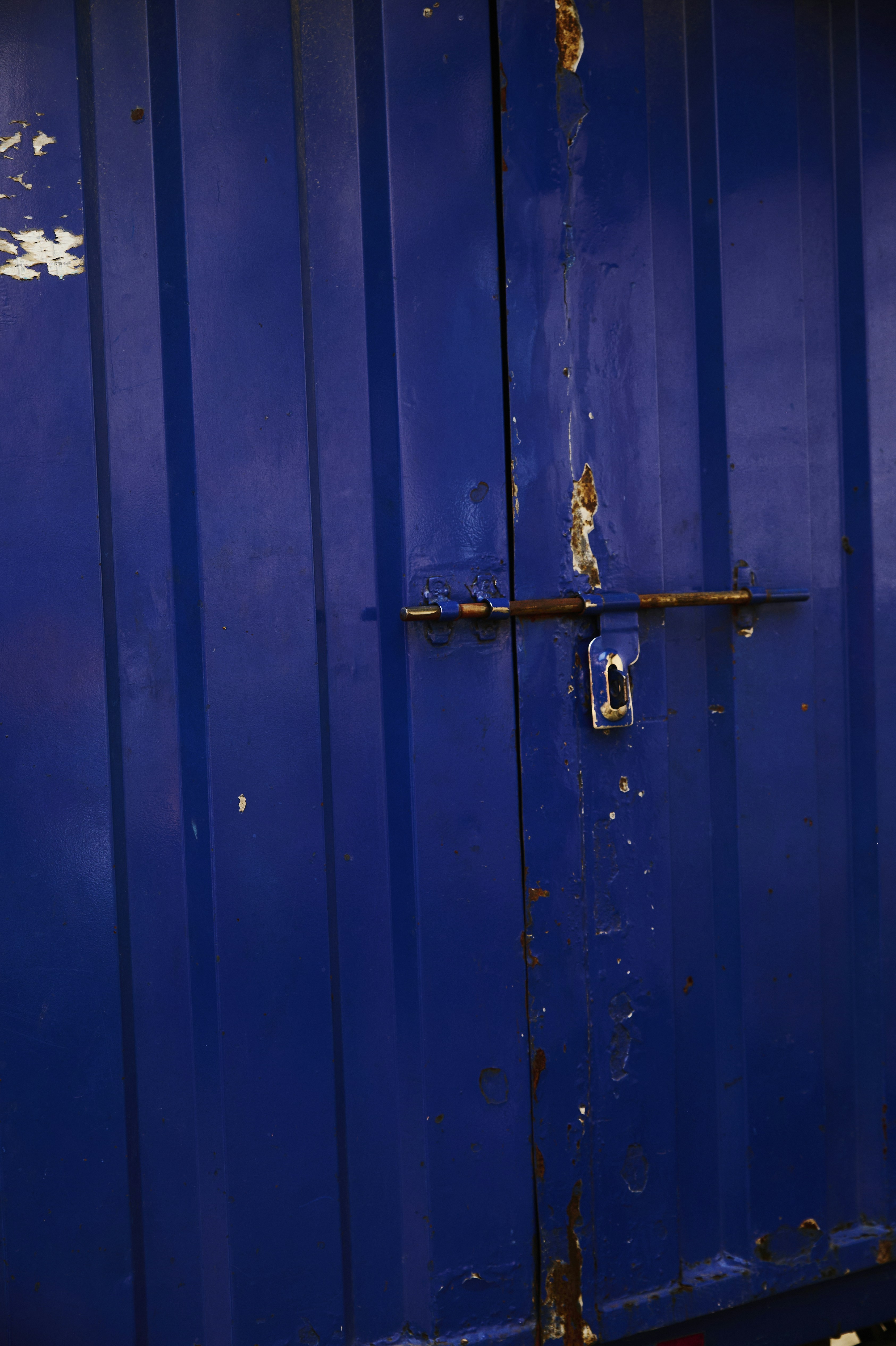 Lock on a Weathered Blue Gate