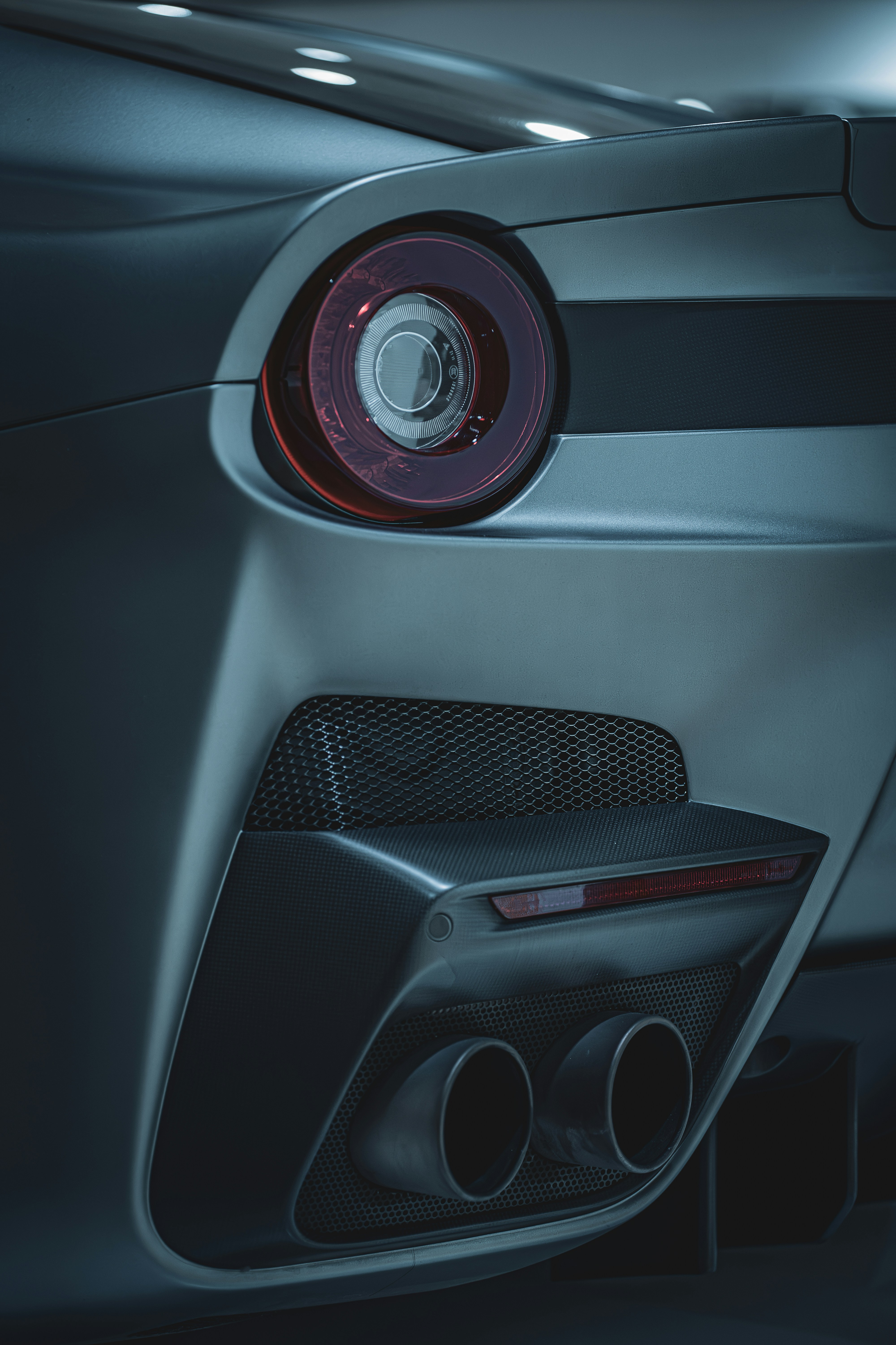 A close up of the rear end of a sports car photo – Free Modena Image on ...