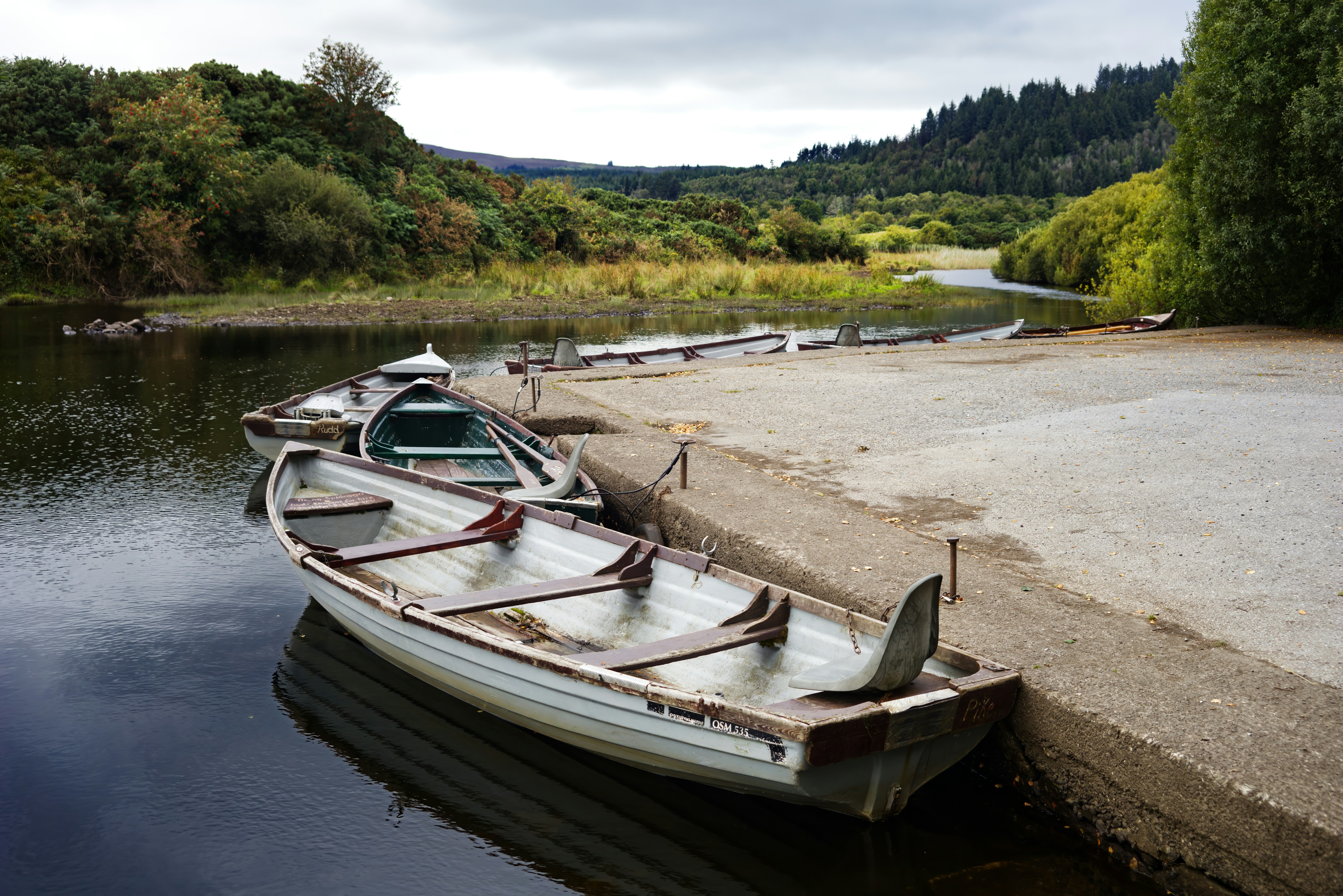 Rowboats at the Quiet Verge of a Winding River