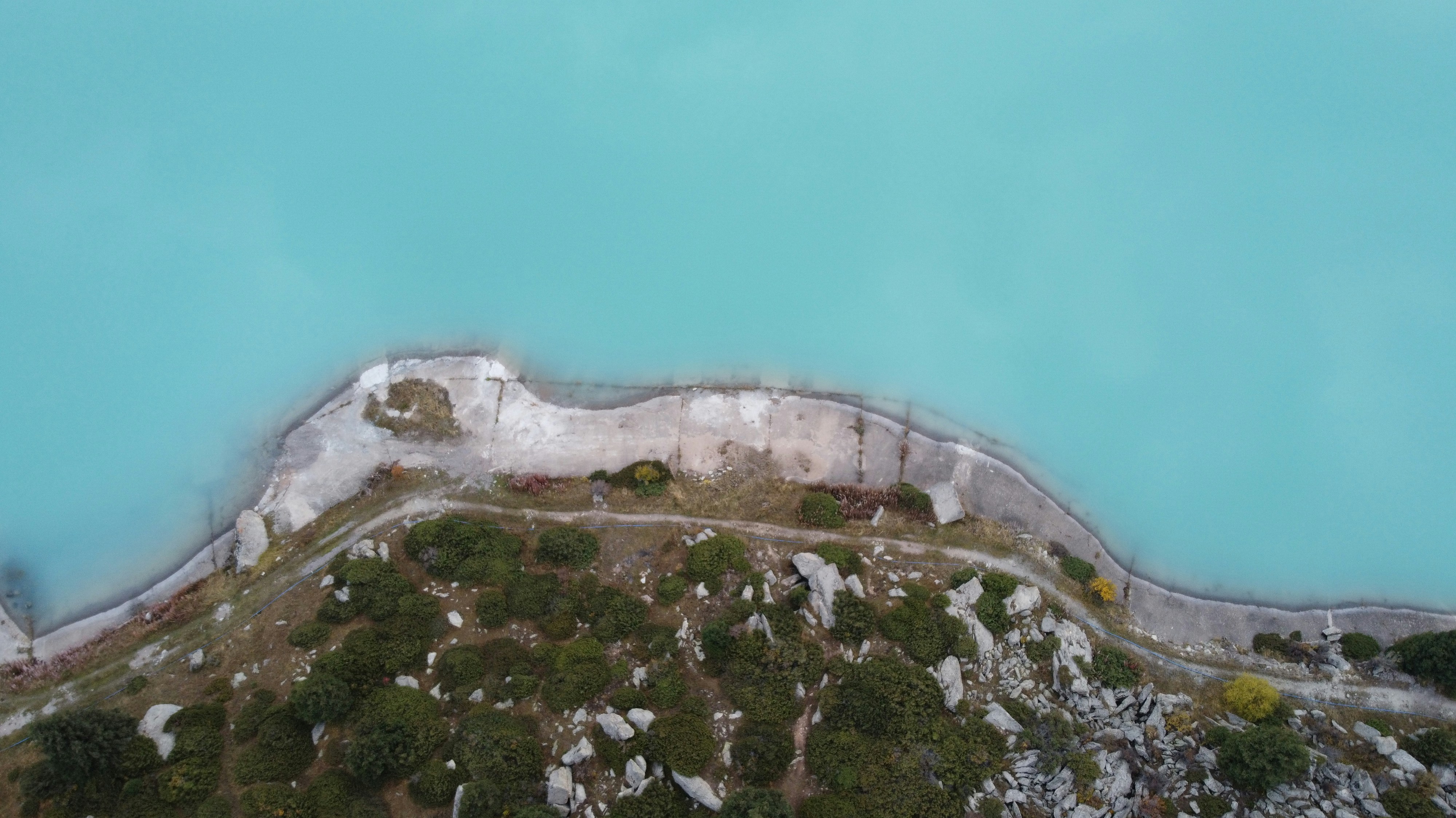 Turquoise Fjord Edge: A Quiet Drone Overlook