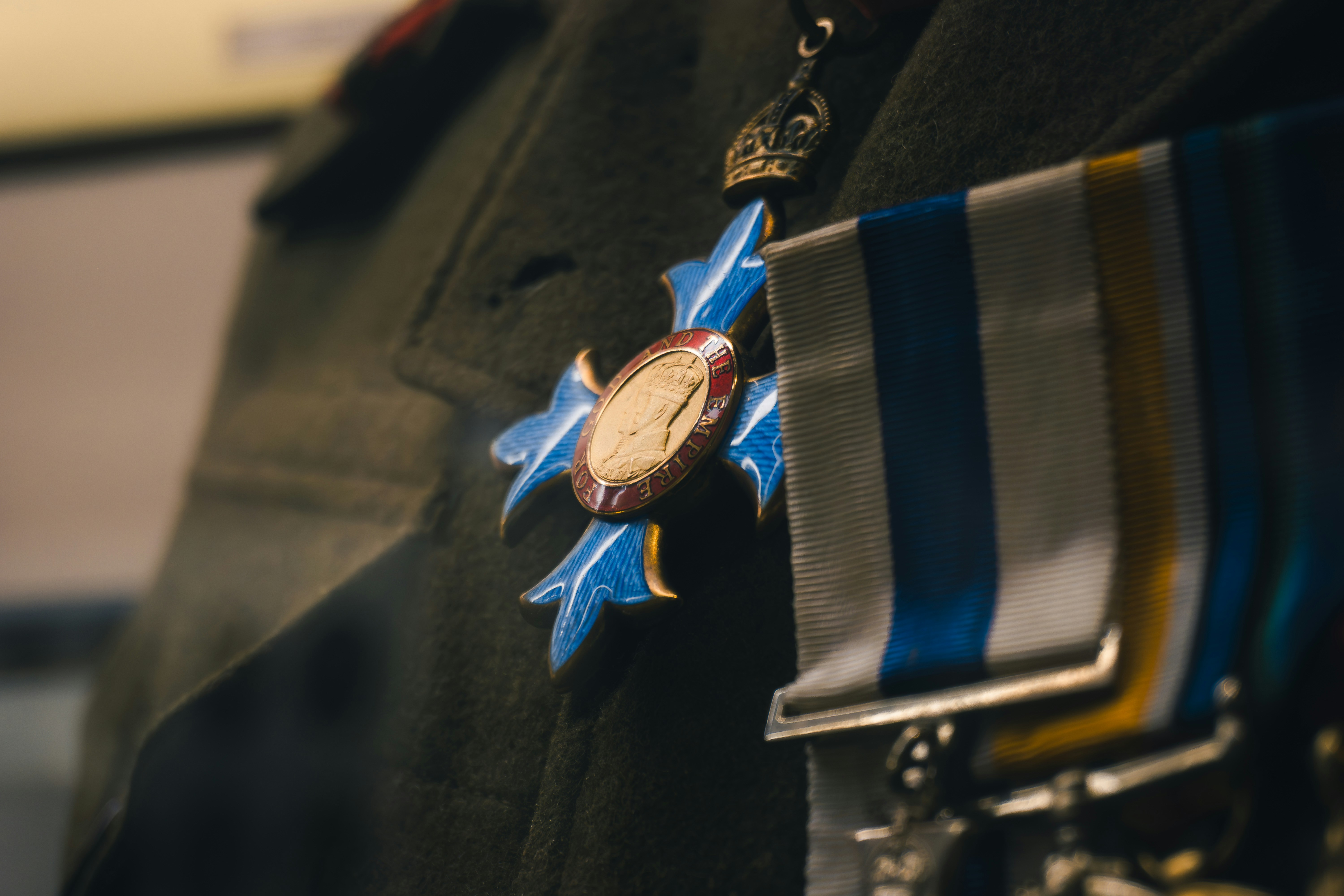 A close up of a person wearing a medal