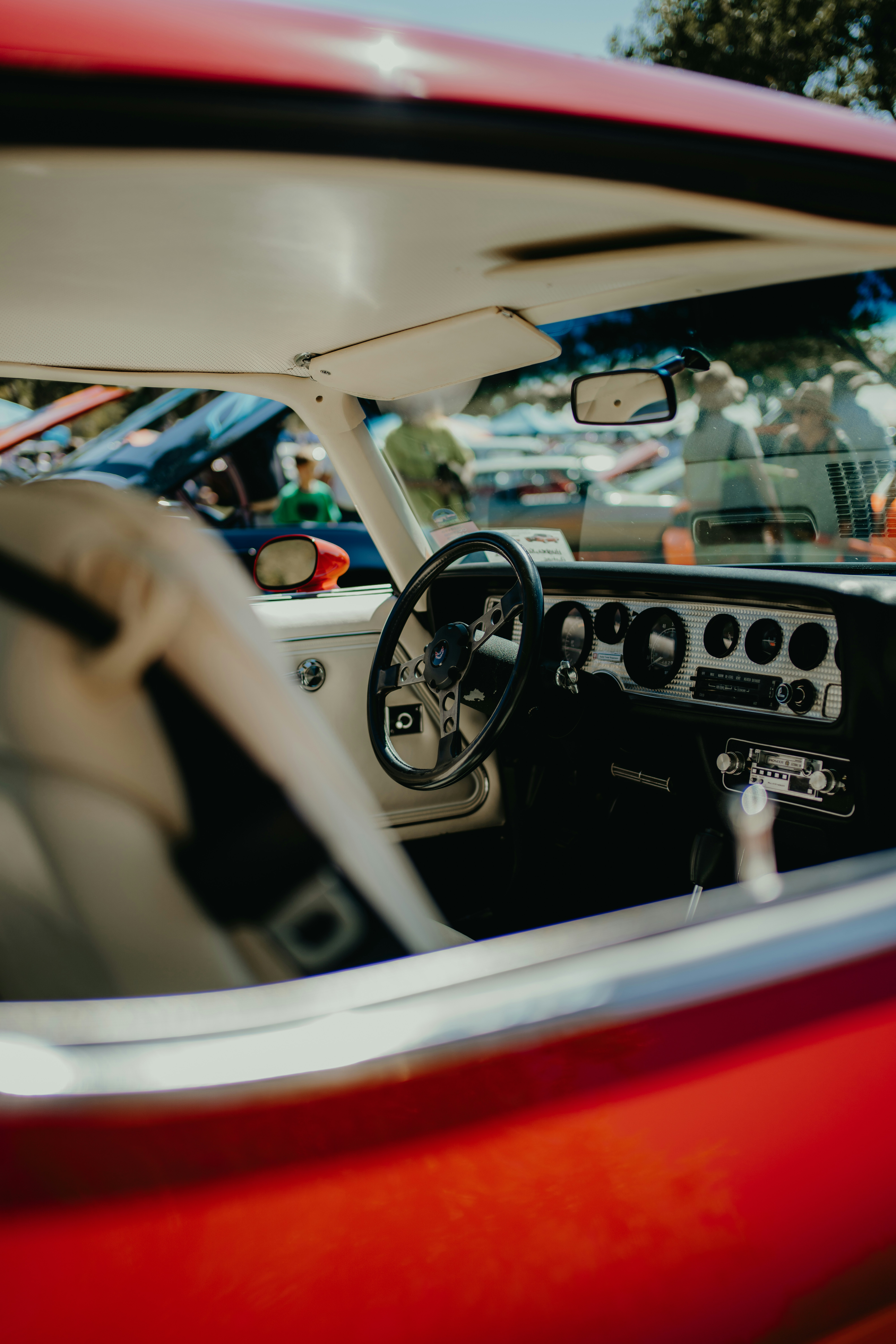 The interior of a red car with a white dash board photo – Free Car ...