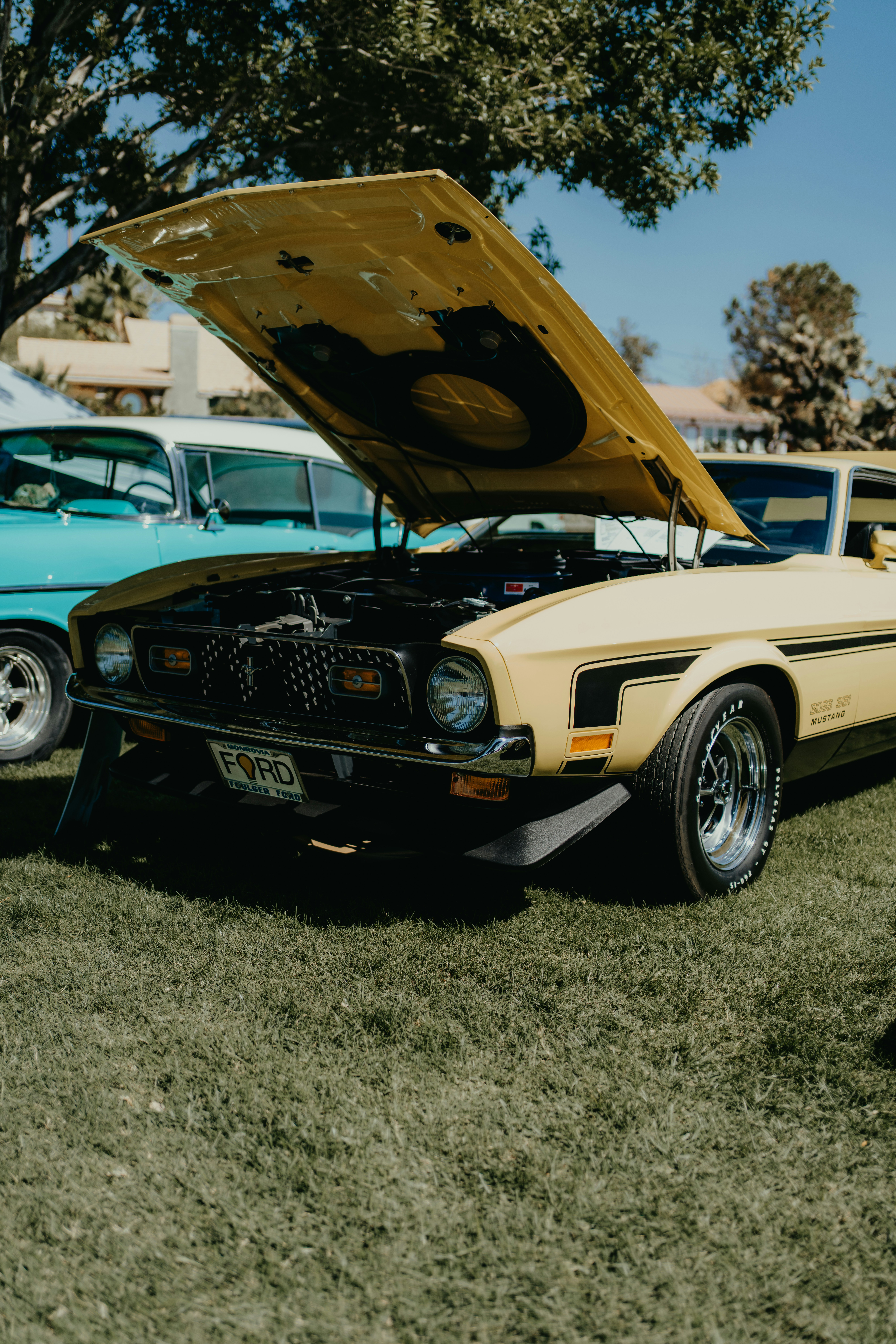 Sunlit Muscle Chrome: A Yellow Classic with Hood Raised