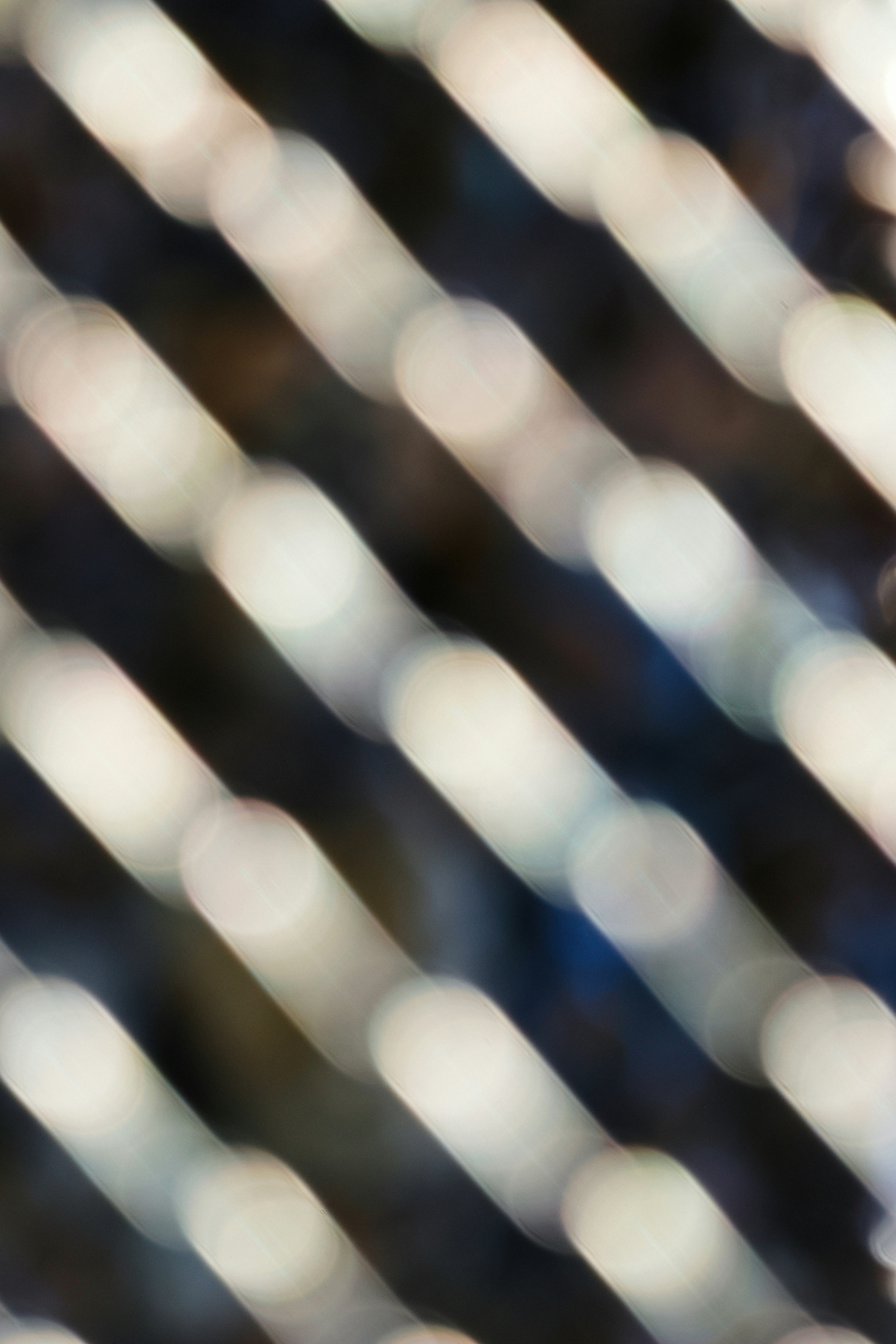 A blurry photo of a cell phone with a blurry background photo – Free ...