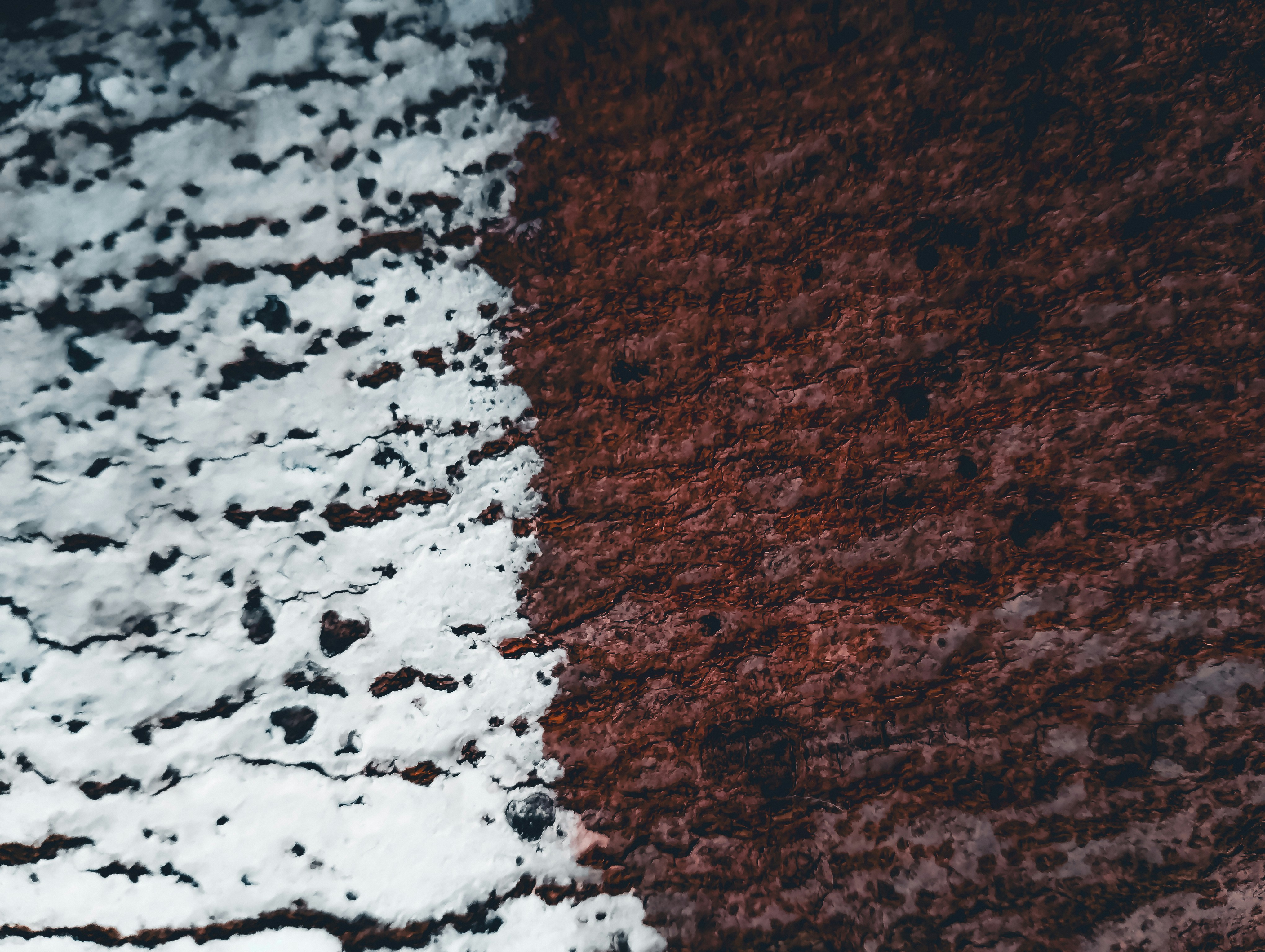 Rugged Boundary: White Shale Meeting Rusted Ground