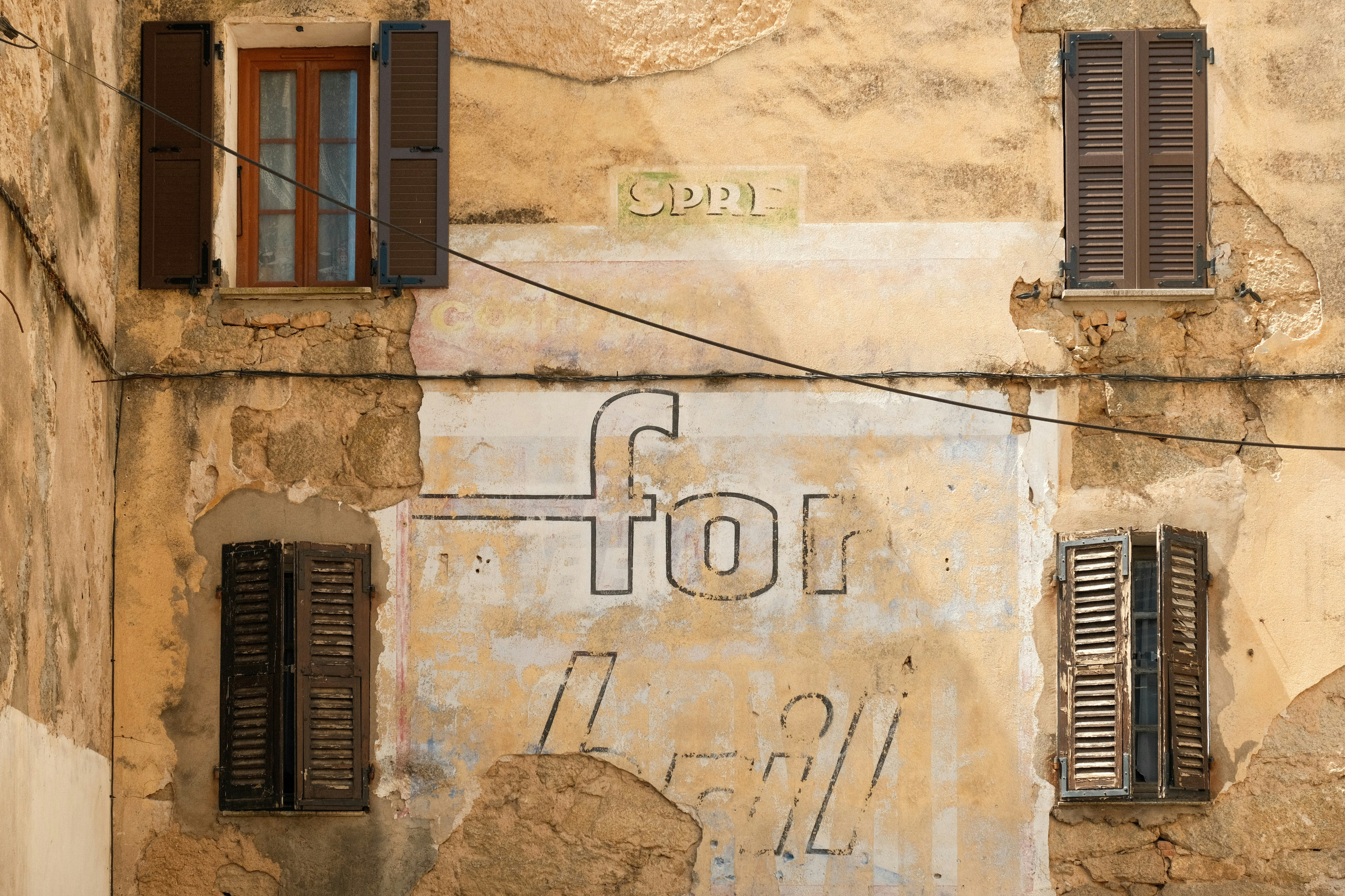 Whispers of Time on an Old Facade