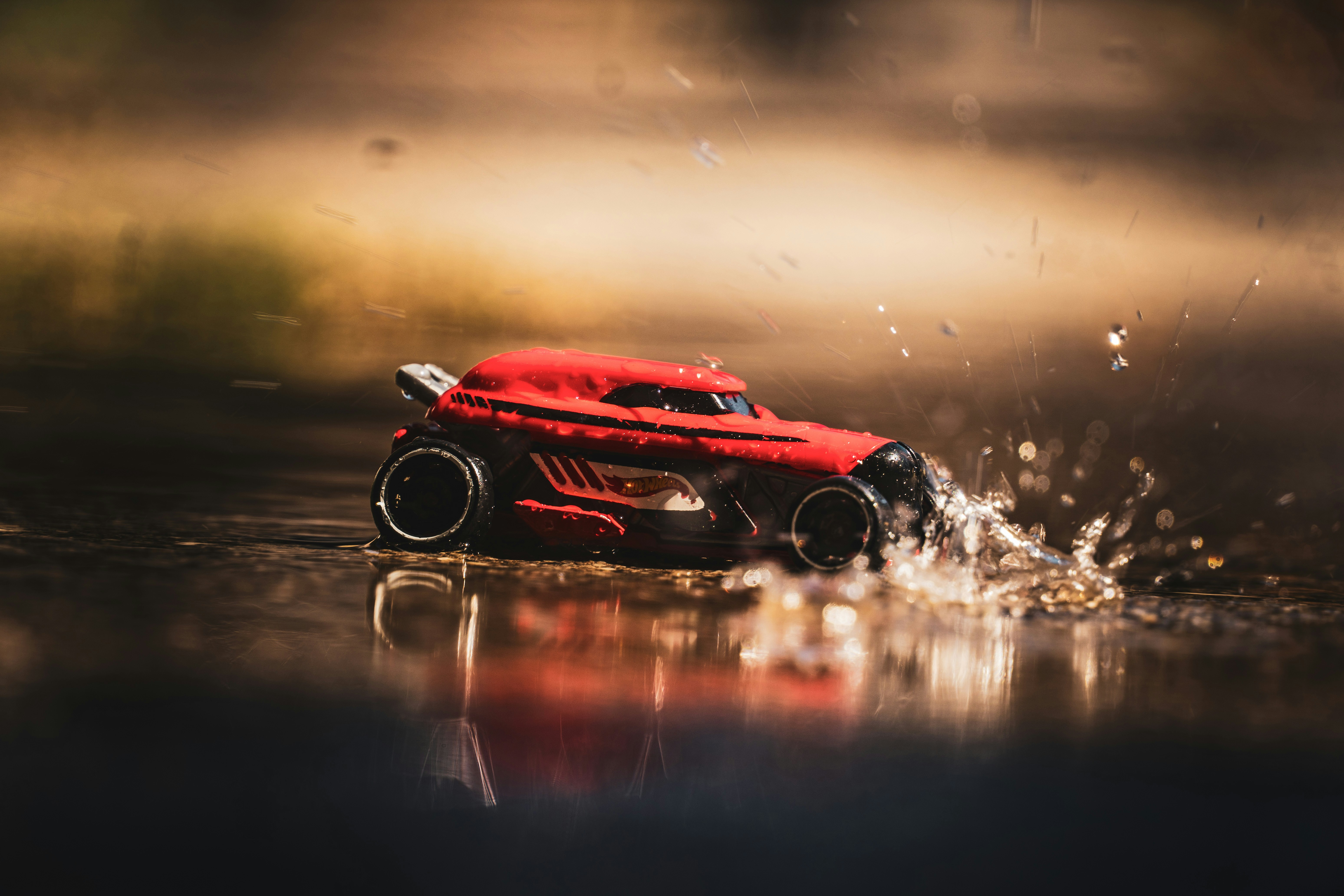 Crimson RC Racer Skims a Wet Stage