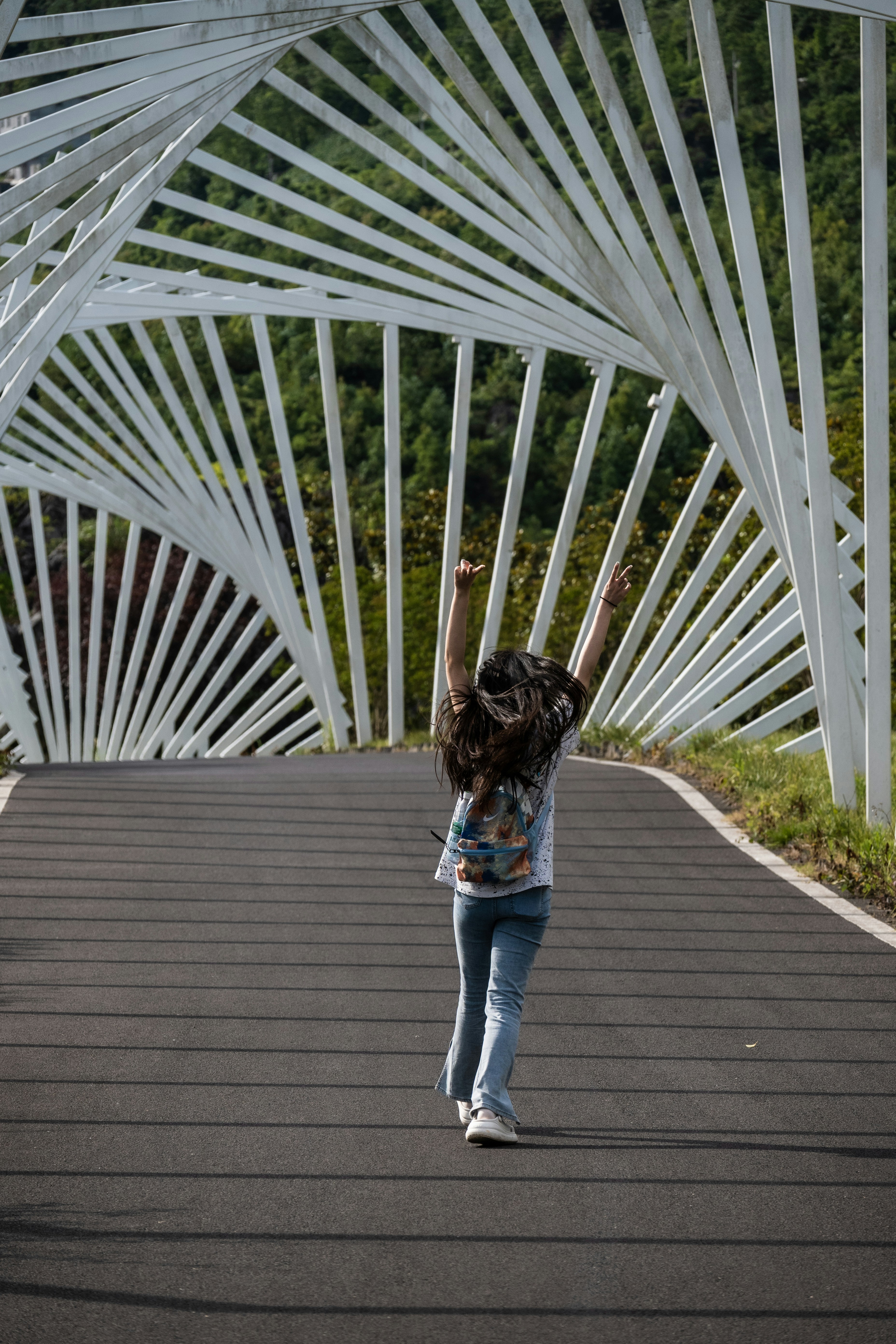 Under the Spiral Arches: A Girl’s Joyful Run