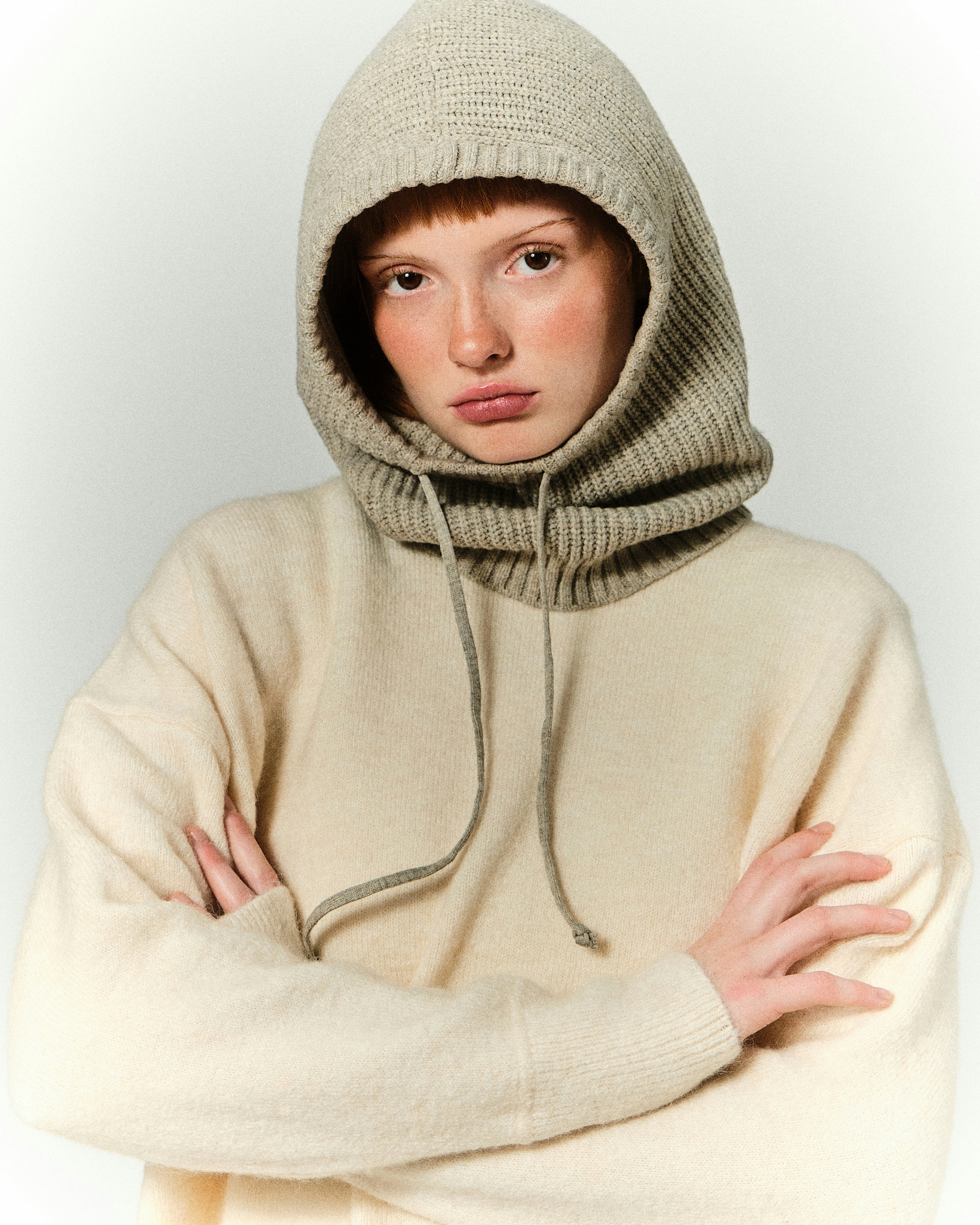 A woman in a hoodie is posing for a picture photo – Free Photo Image on ...
