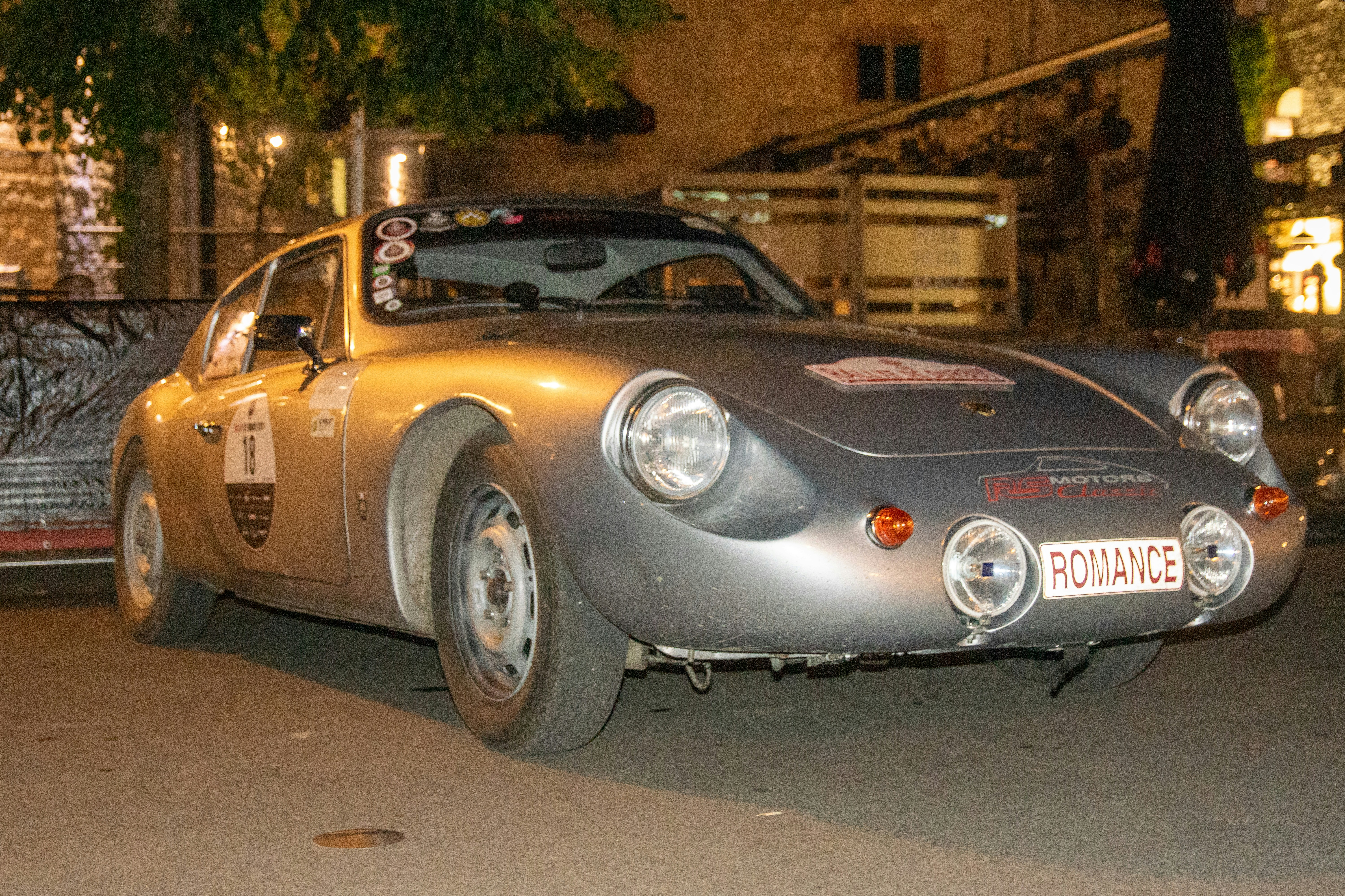 Romance on Night Wheels: A Vintage Porsche in City Lights