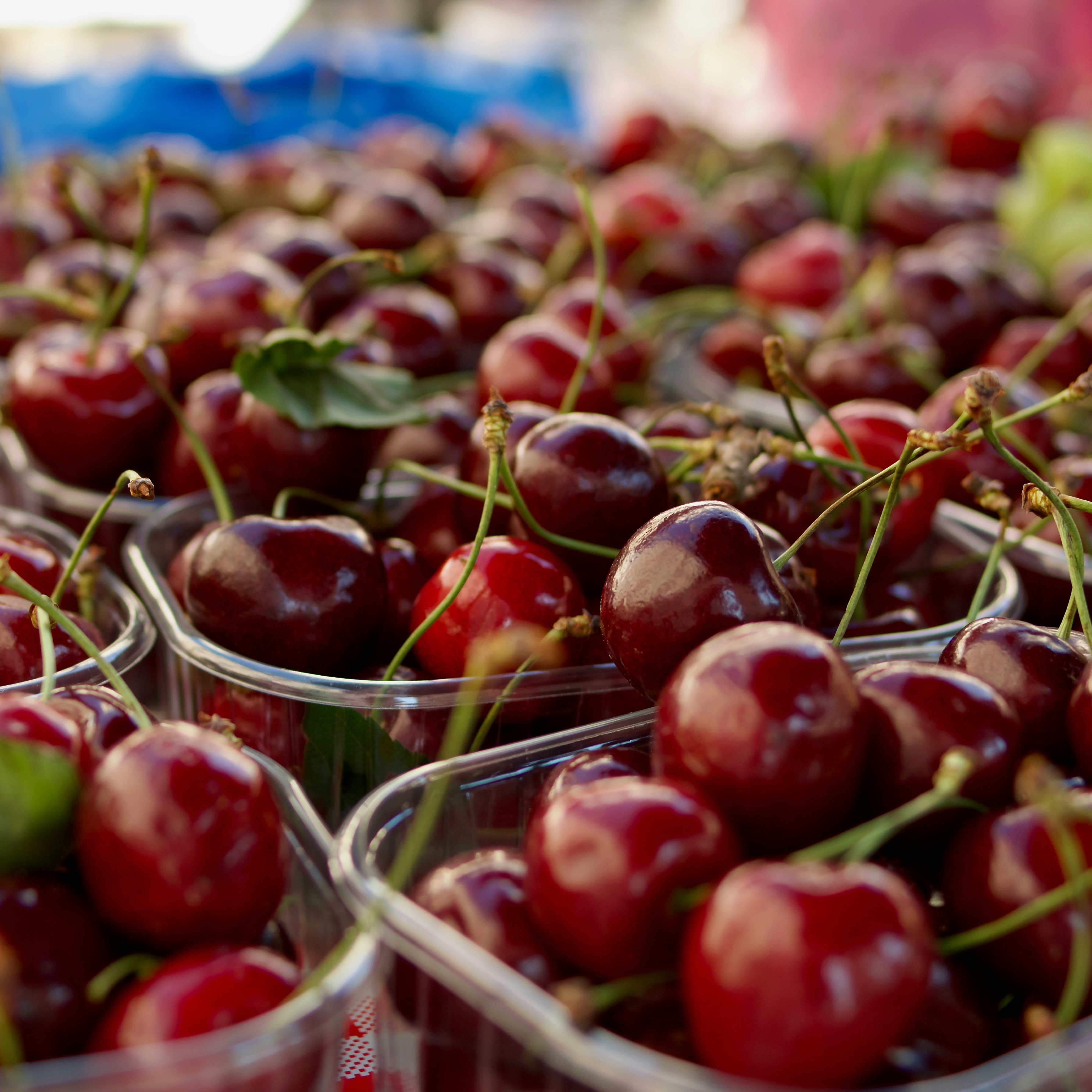 Cherry Cascade in Clear Cups Under Market Glow