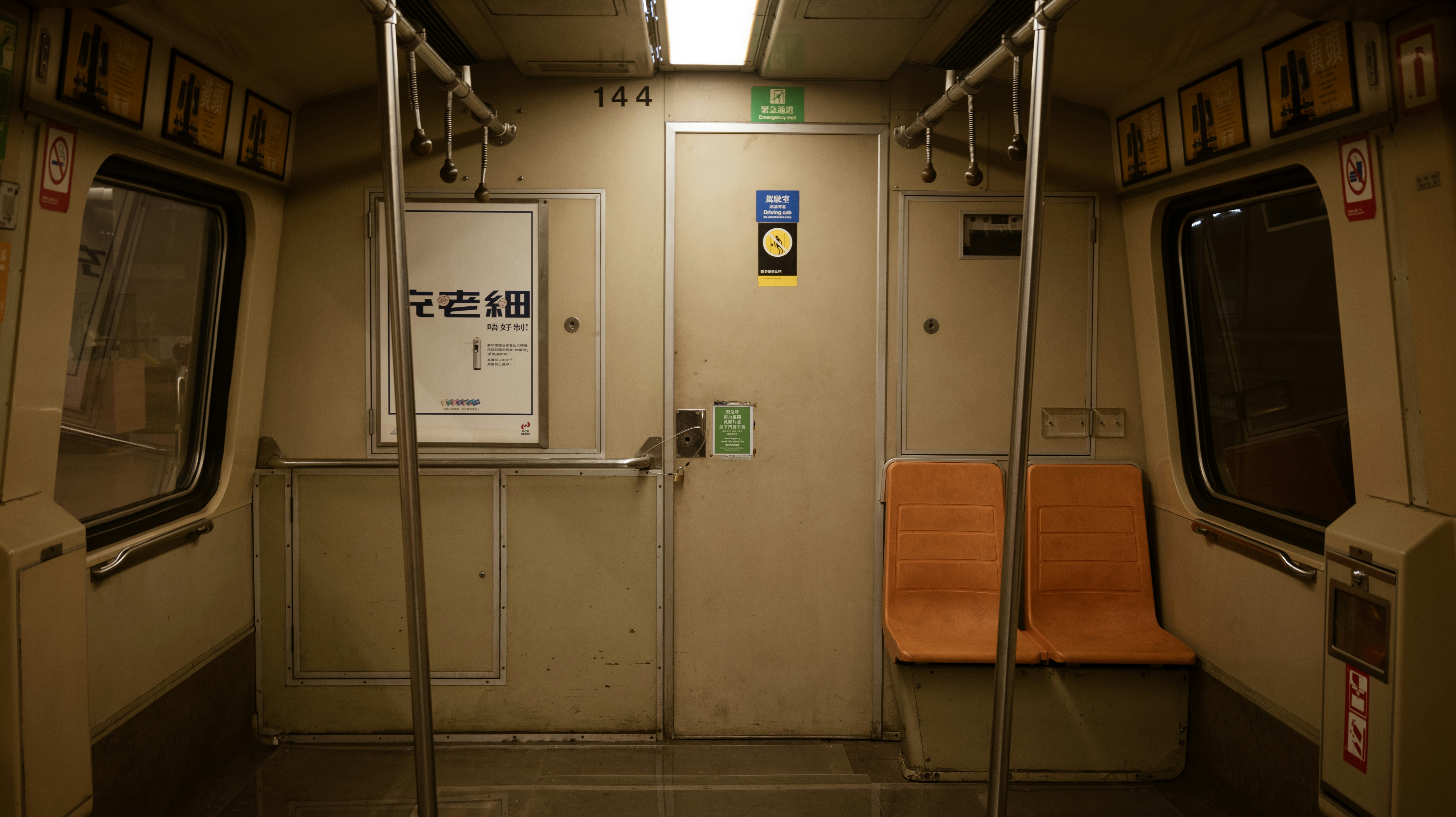 Amber Silence: Empty Subway Car at Dusk