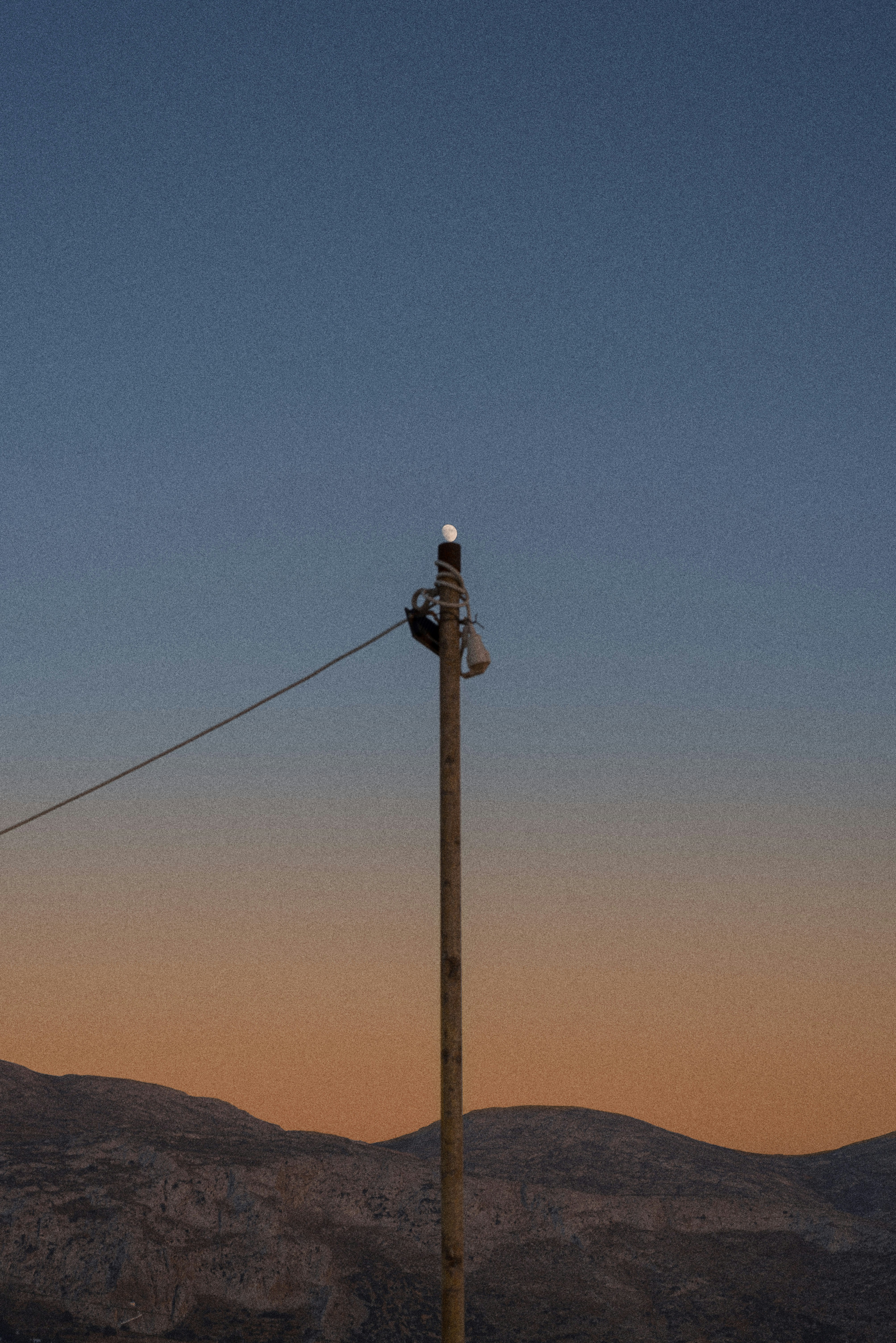 Pole at Dusk: A Silent Summit Under a Gradient Sky