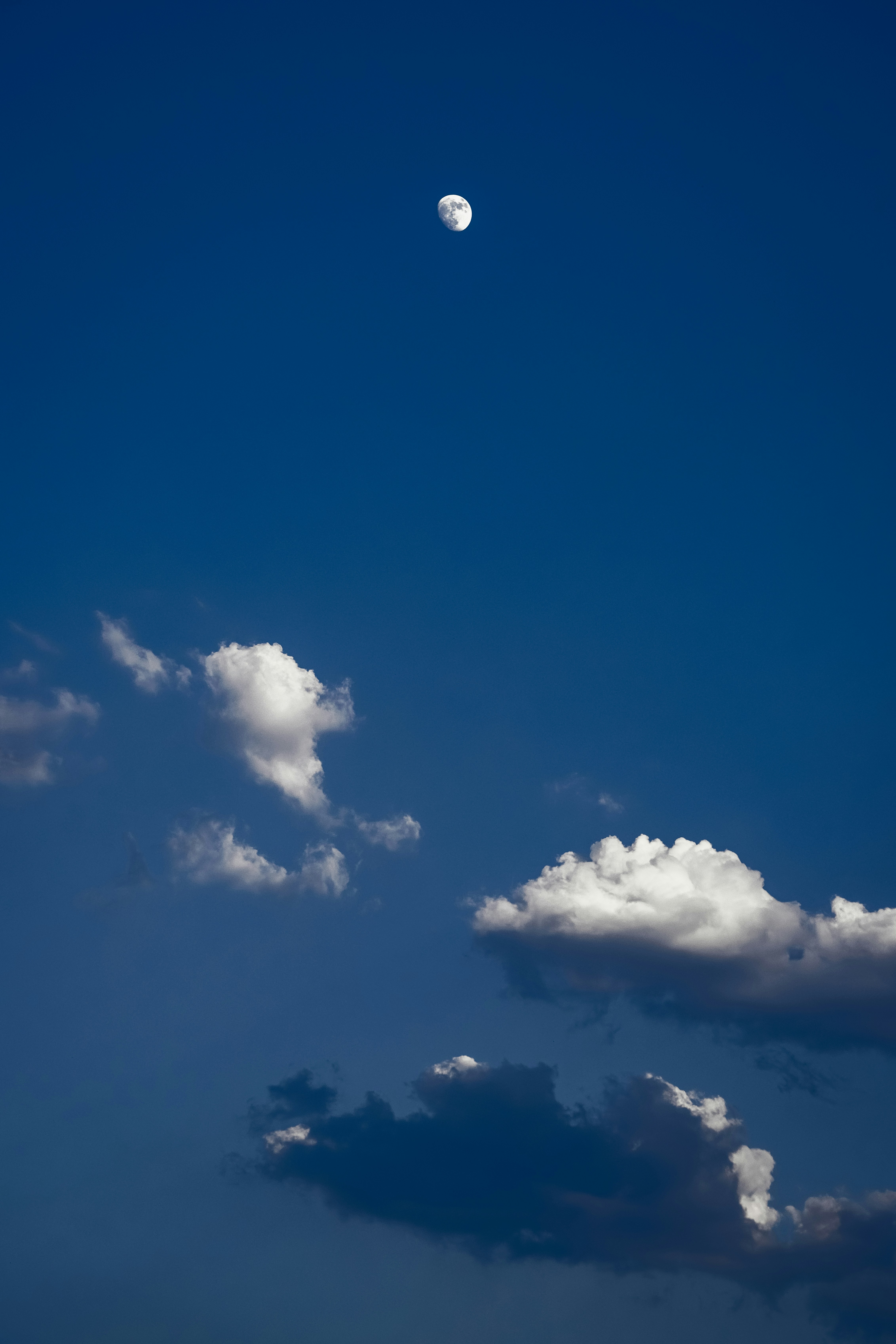 The moon is shining in the blue sky photo – Free Sky Image on Unsplash