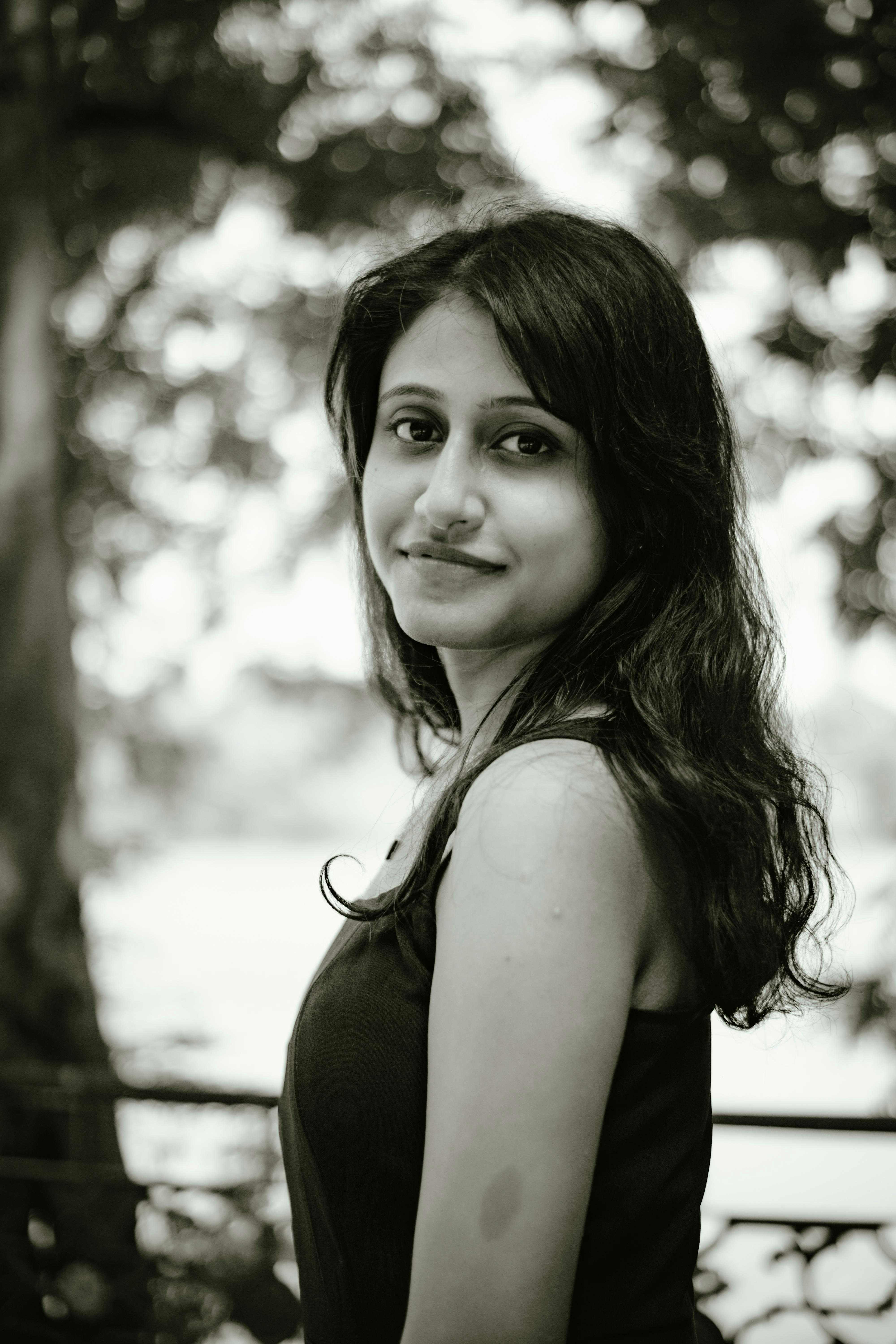 A black and white photo of a woman smiling photo – Free Face Image on ...