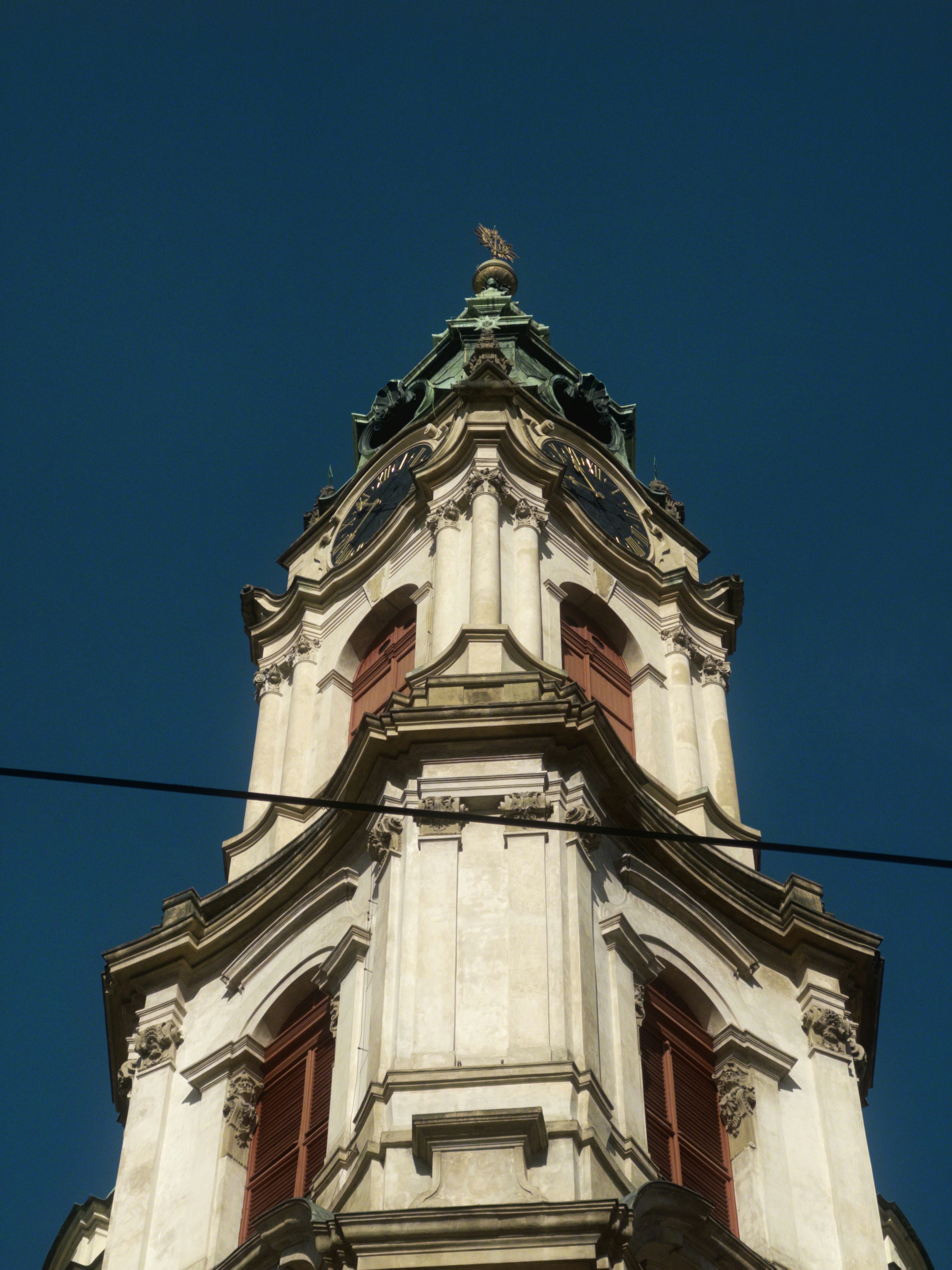 A tall tower with a clock on the top of it photo – Free Bell tower ...