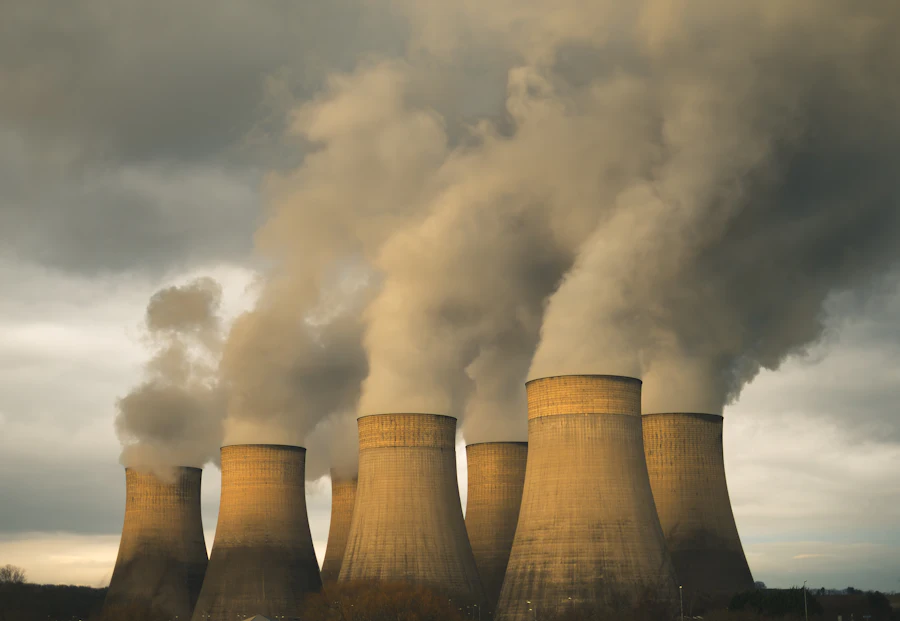 Ratcliffe-on-Soar Power Station near Nottingham whilst operating, was the last coal fired power station in the UK | A group of smoke stacks emitting from a factory