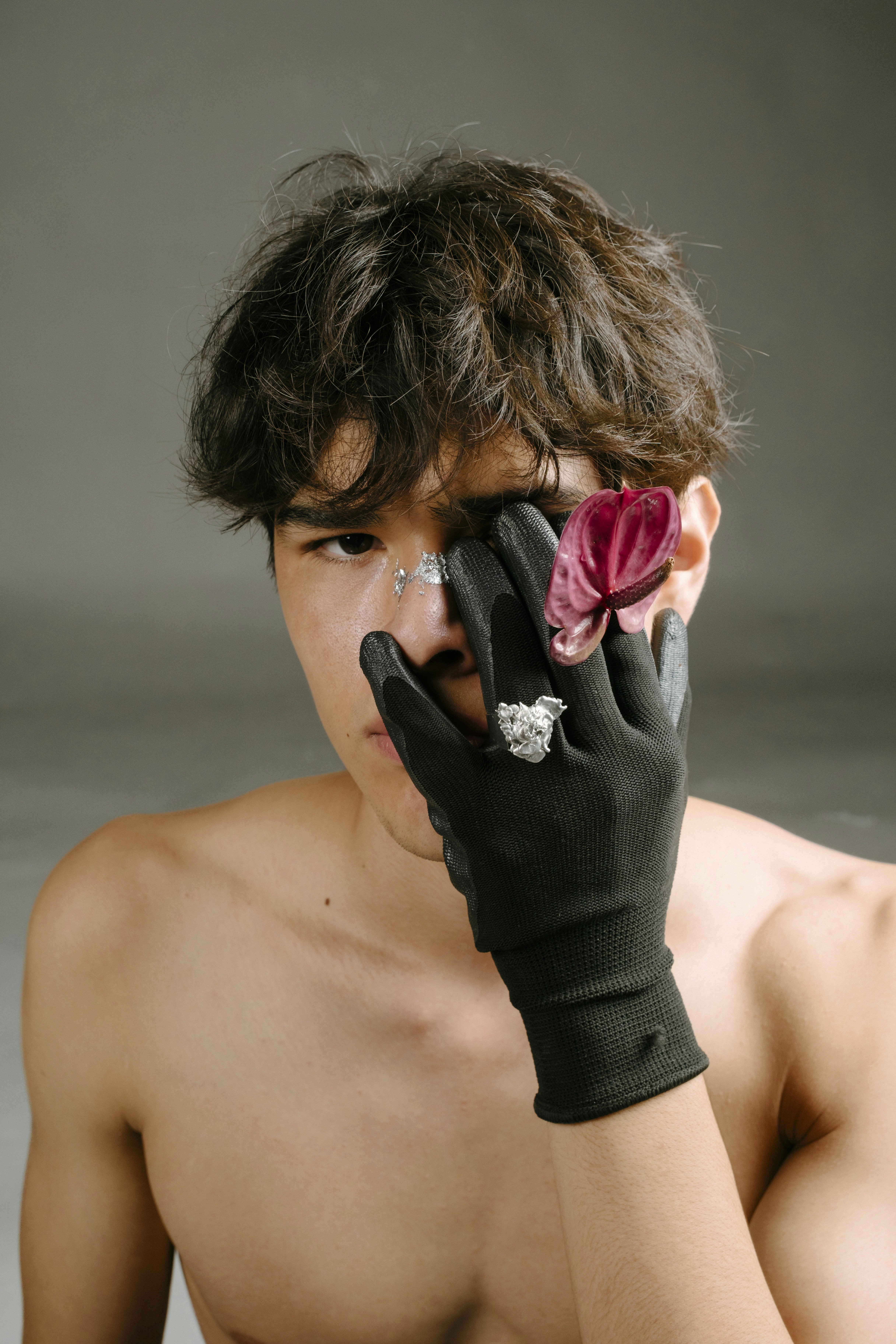 Gloved Spotlight: A Portrait of Intrigue and Sudden Color