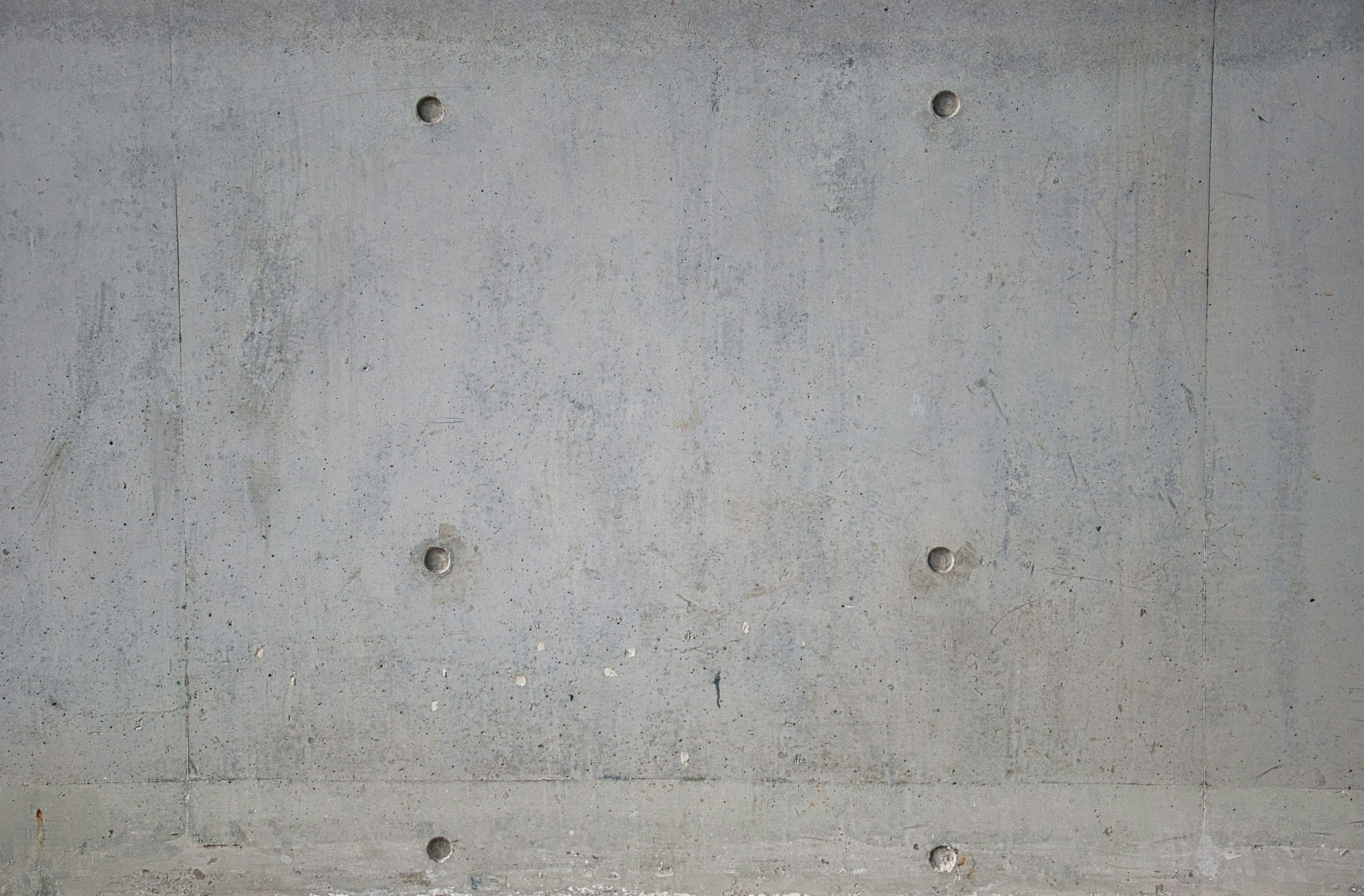 A red fire hydrant sitting in front of a cement wall photo – Free ...