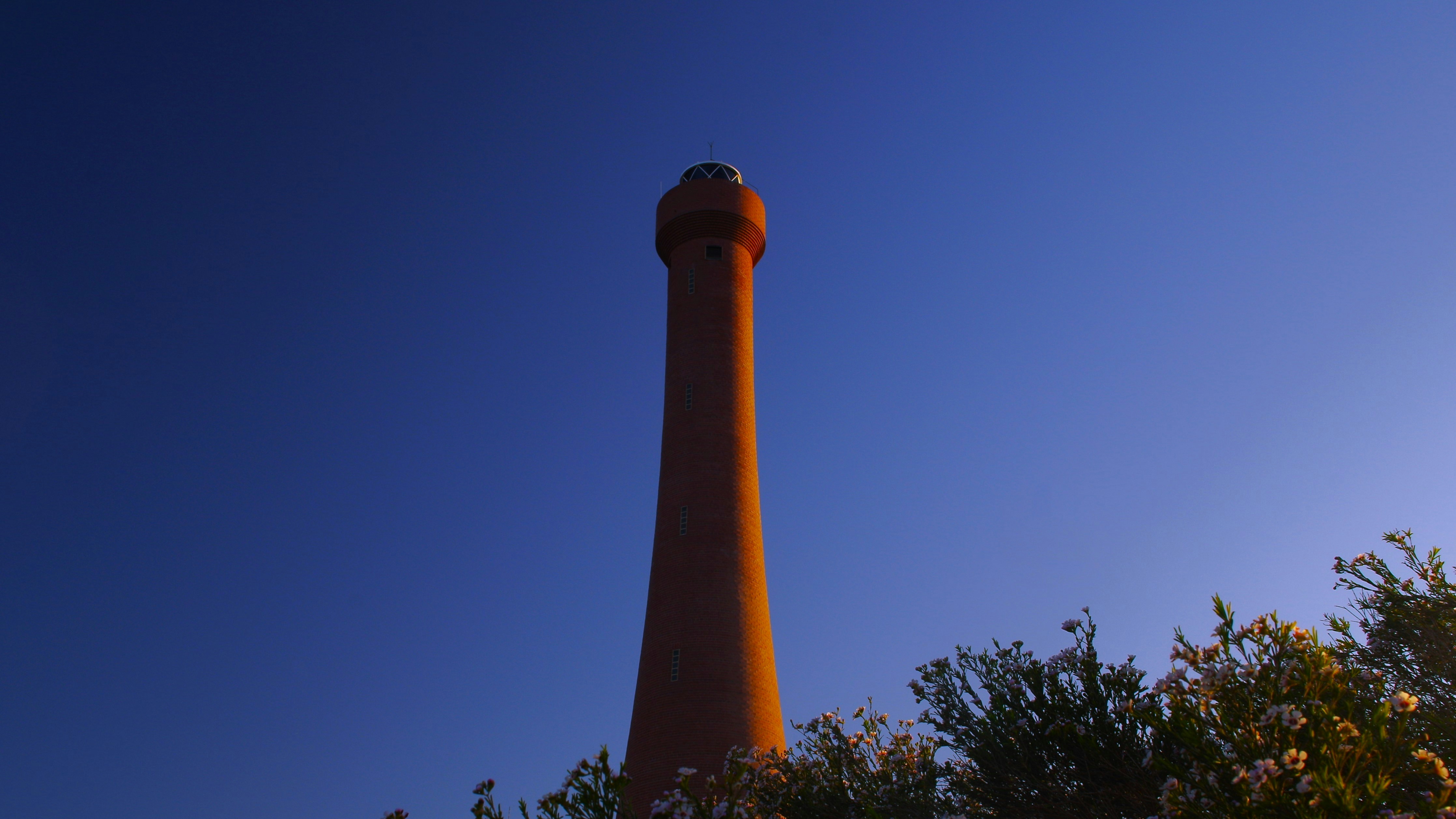 A tall tower with a clock on the top of it photo – Free Guilderton wa ...