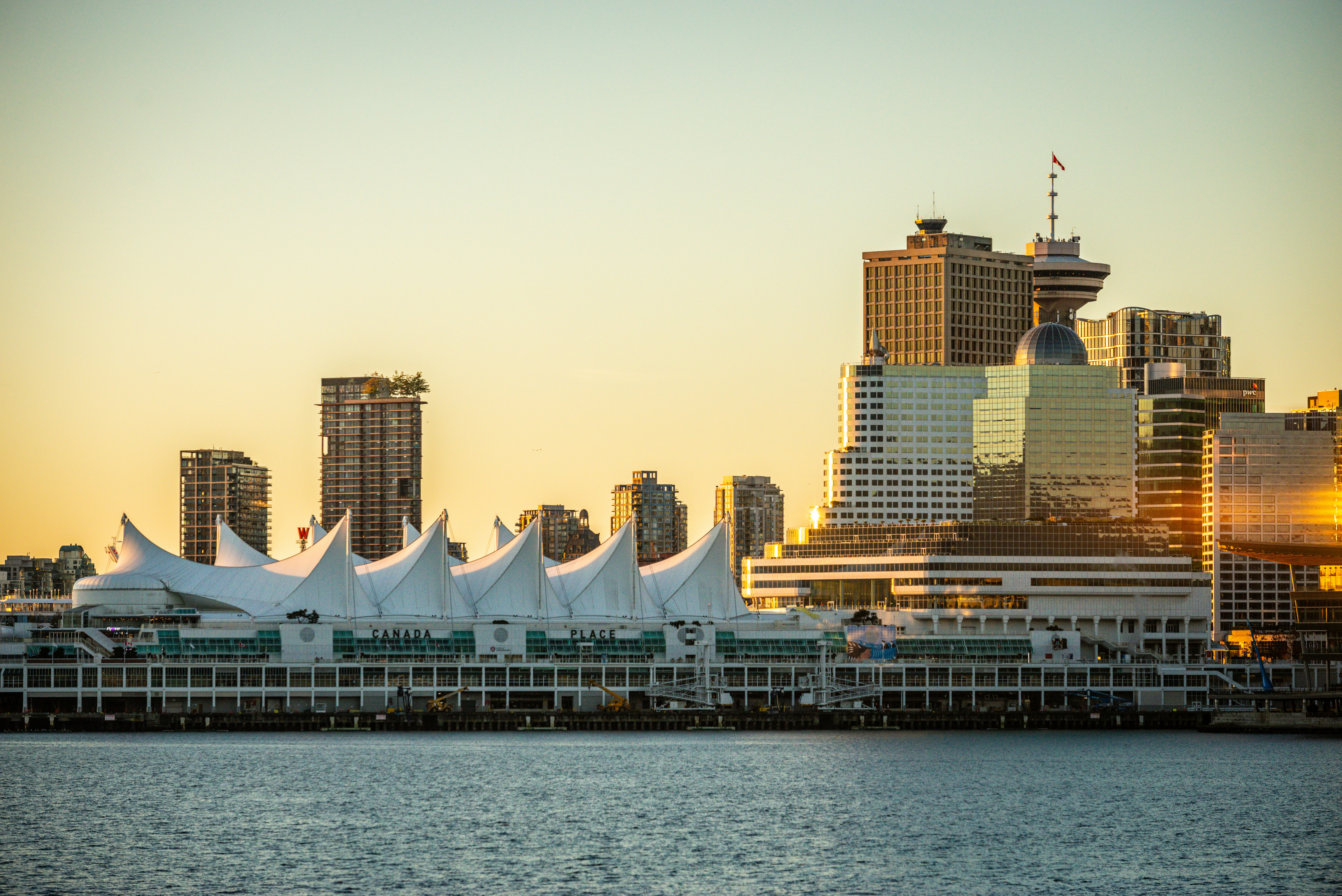 Sails at Sunset: Vancouver's Waterfront Silhouette