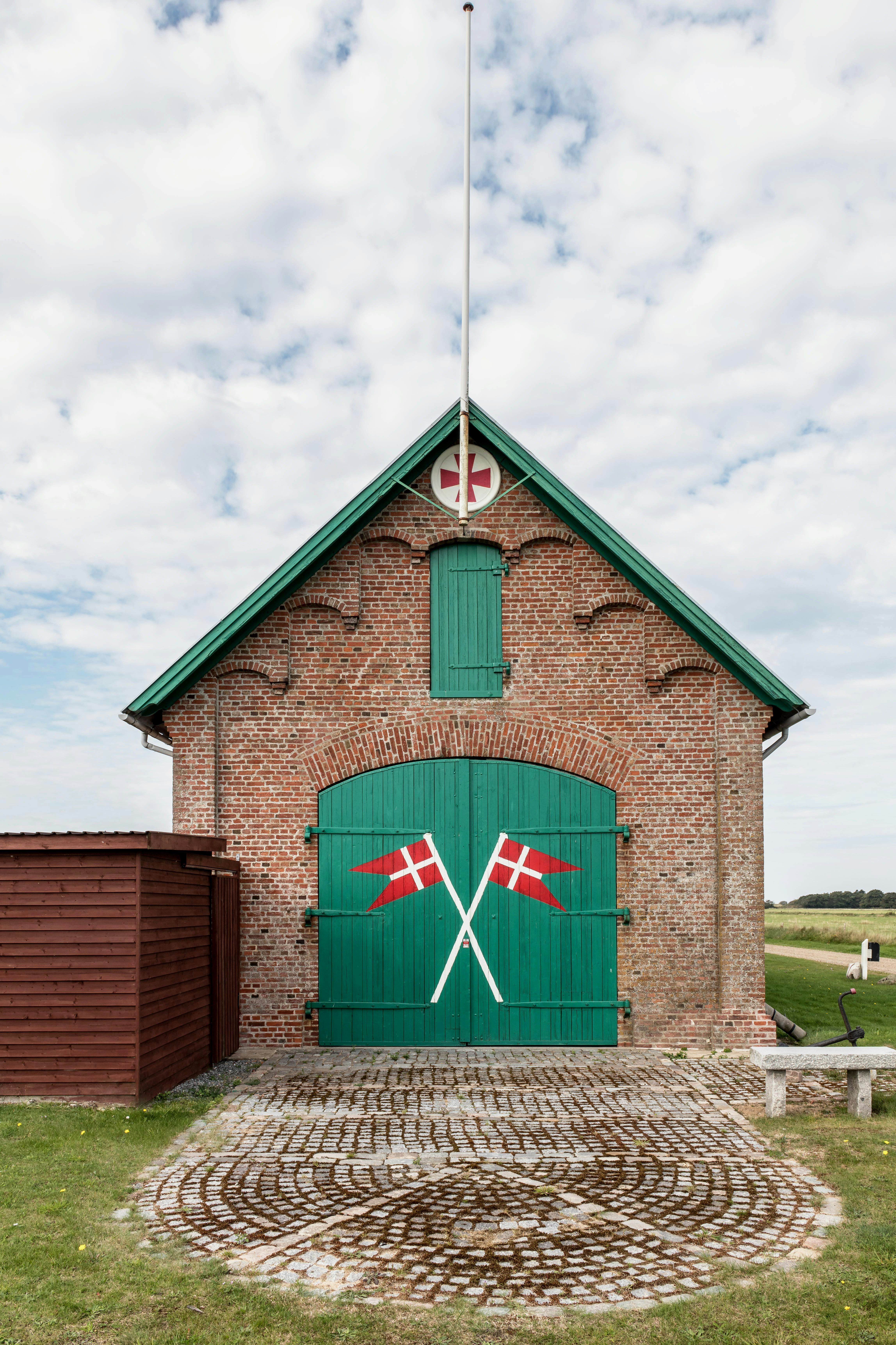Crossed Dannebrog over a Brick Barn: Symmetry in Danish Countryside