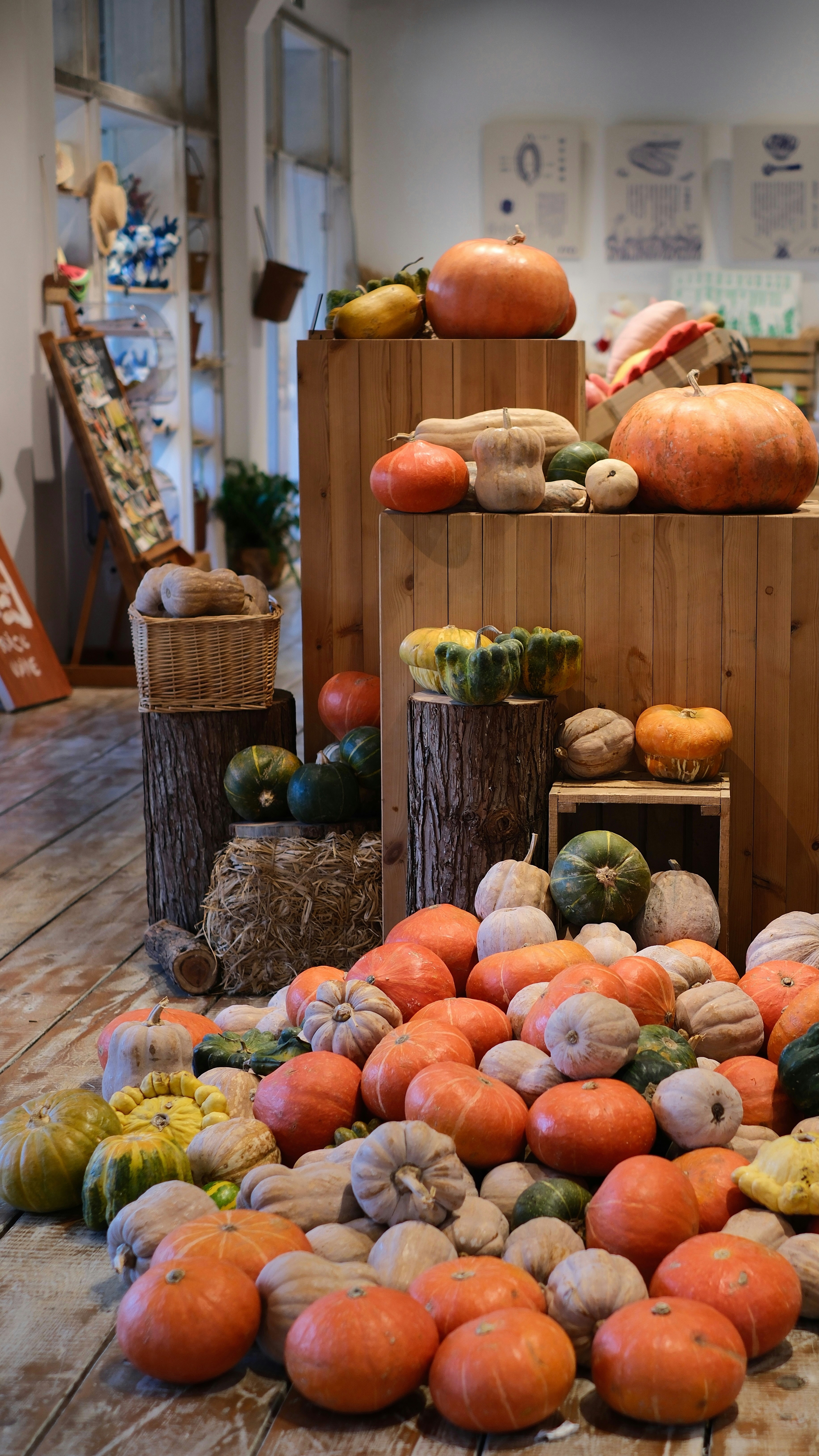 Tiered Harvest: A Rustic Pumpkin Display in Warm Market Light
