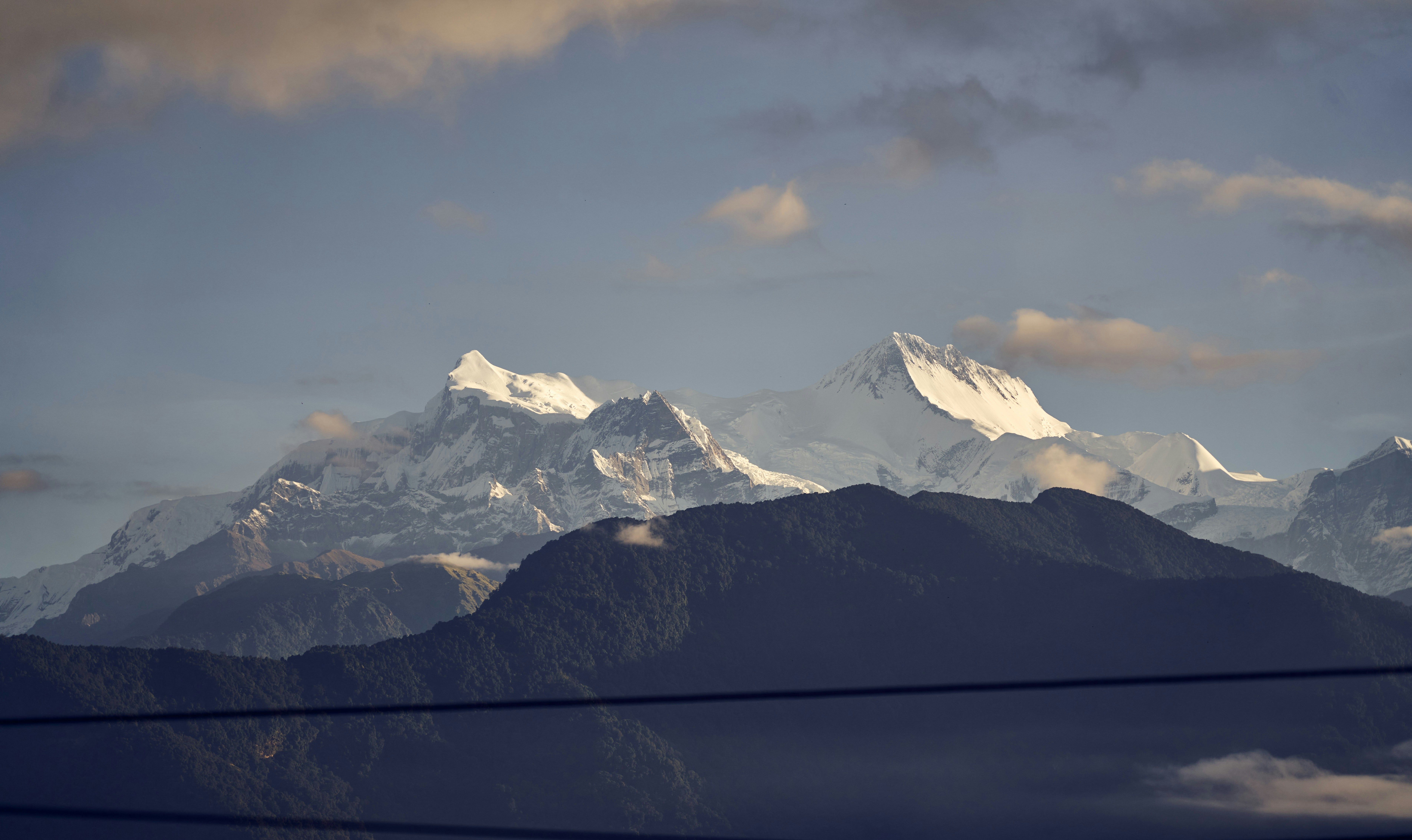 A view of a mountain range from a train window photo – Free Nepal Image ...