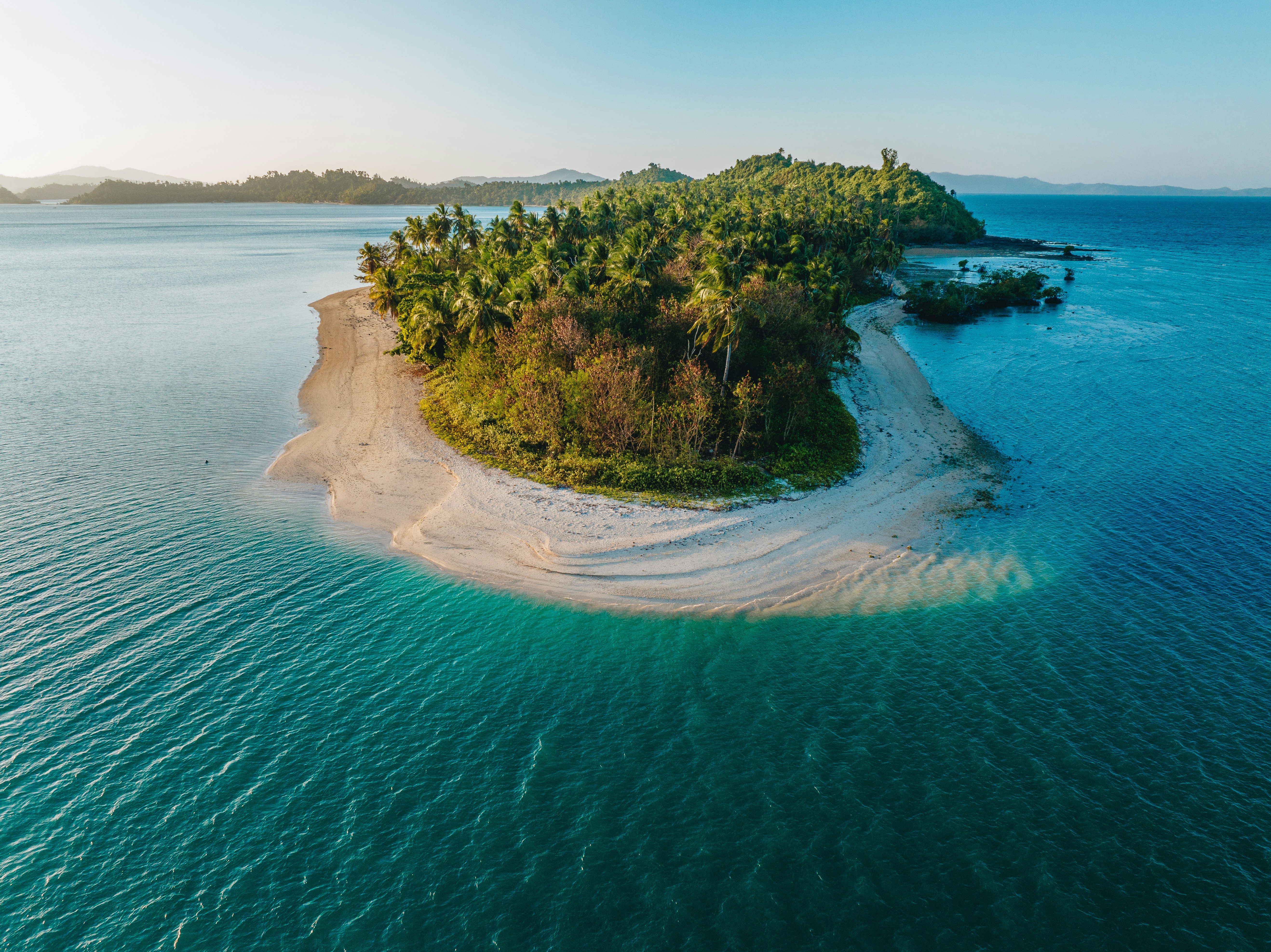A small island in the middle of the ocean photo – Free Philippines ...