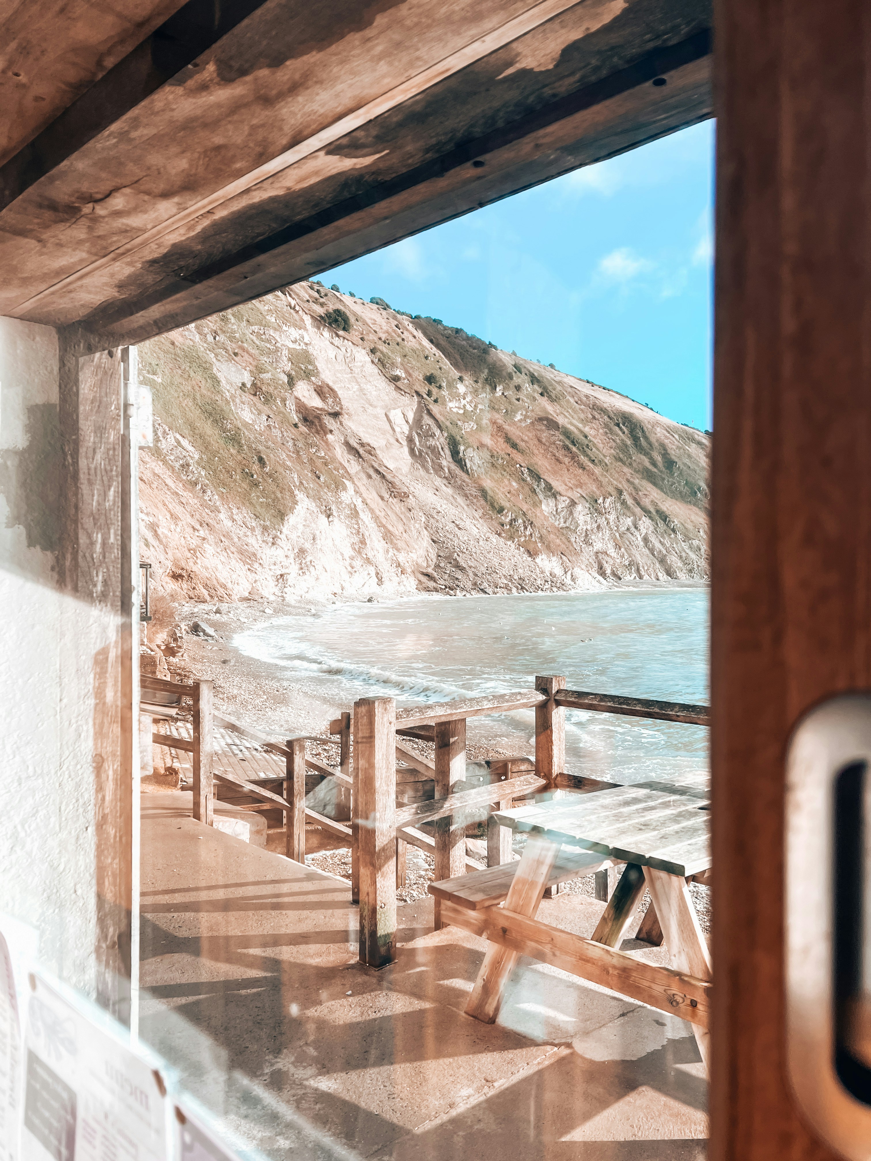 Through a Weathered Portal: Cliffside Seascape