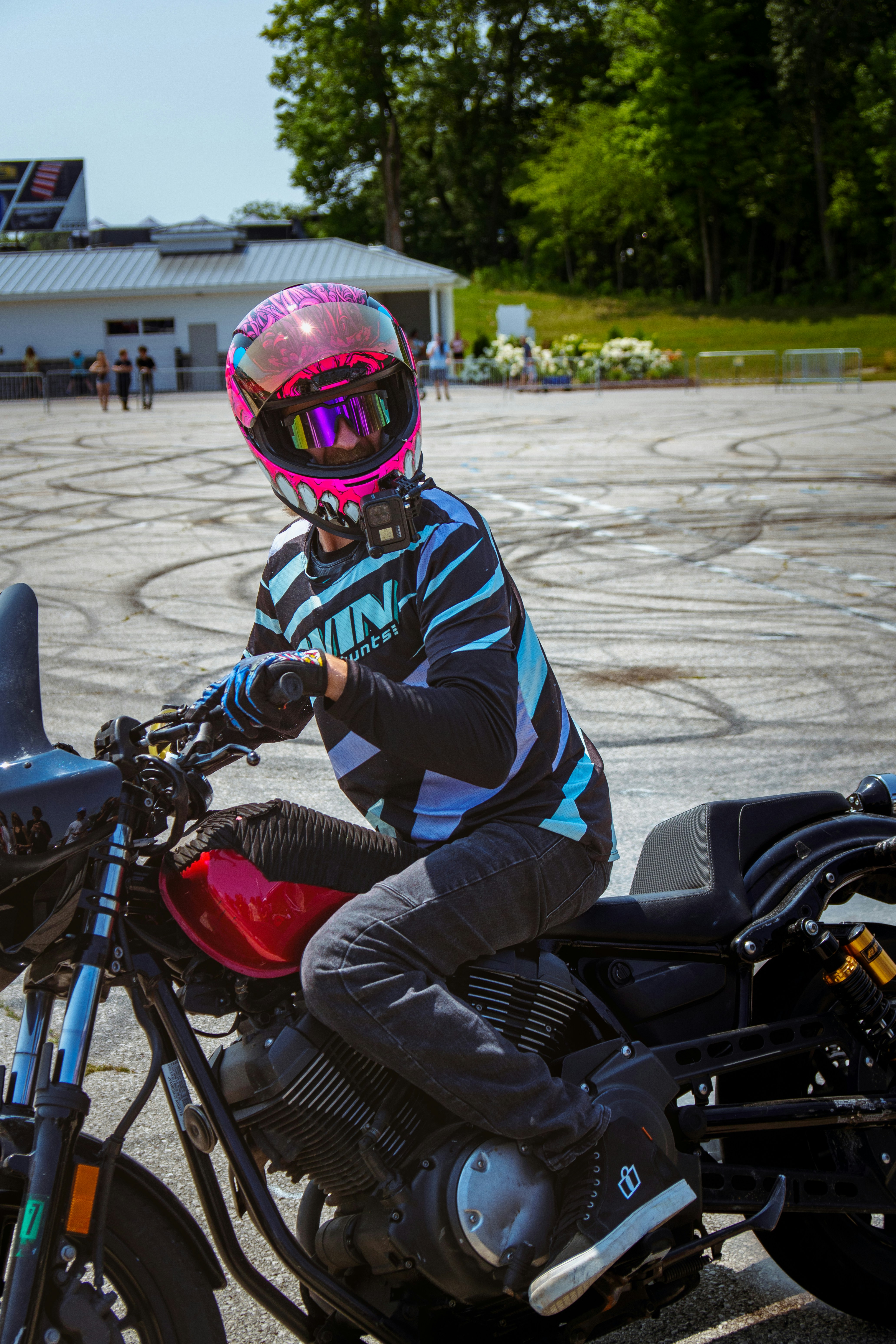 Neon-helmeted Rider on a Modern Black Motorcycle