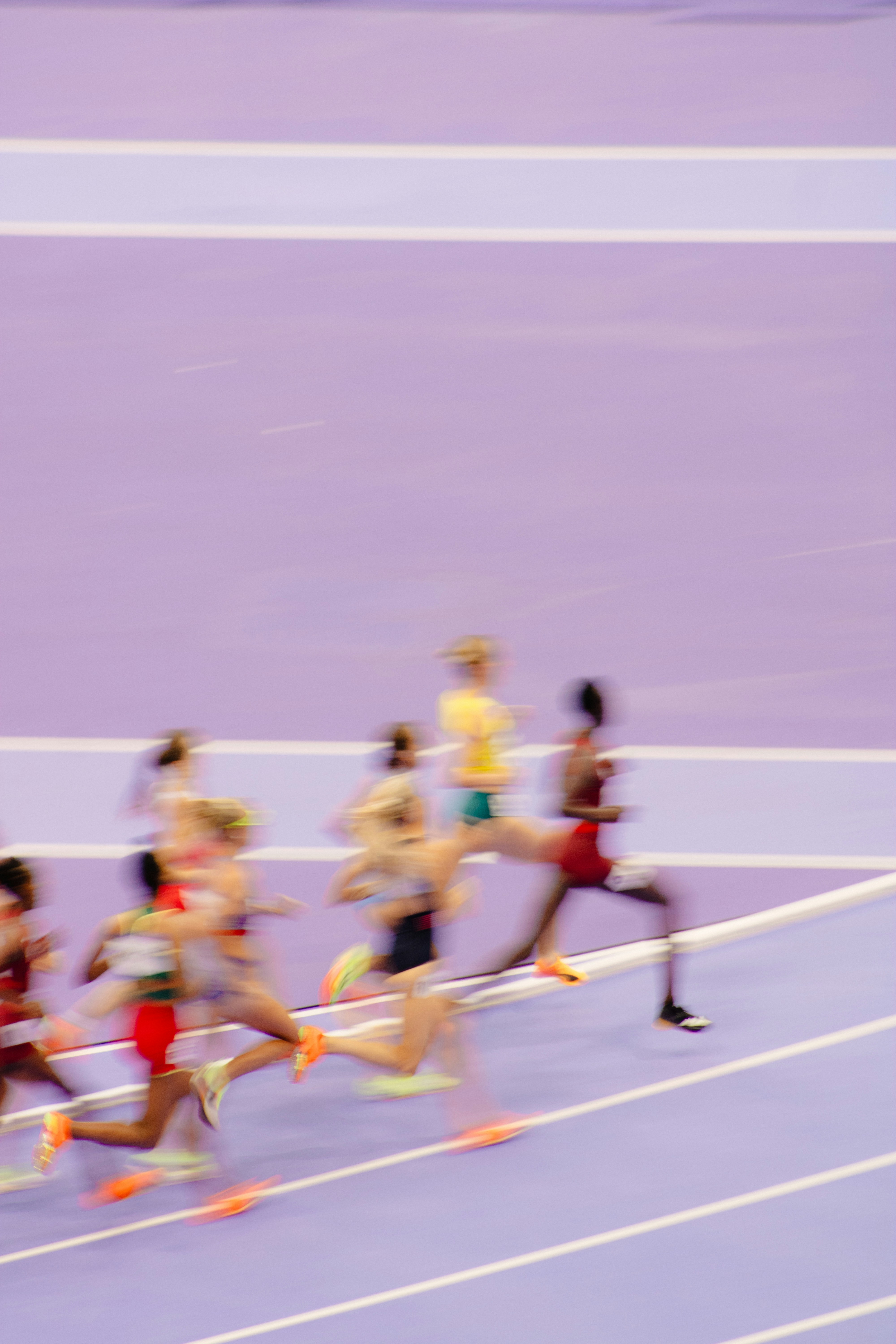 A group of people running on a track photo – Free Stade de france Image ...