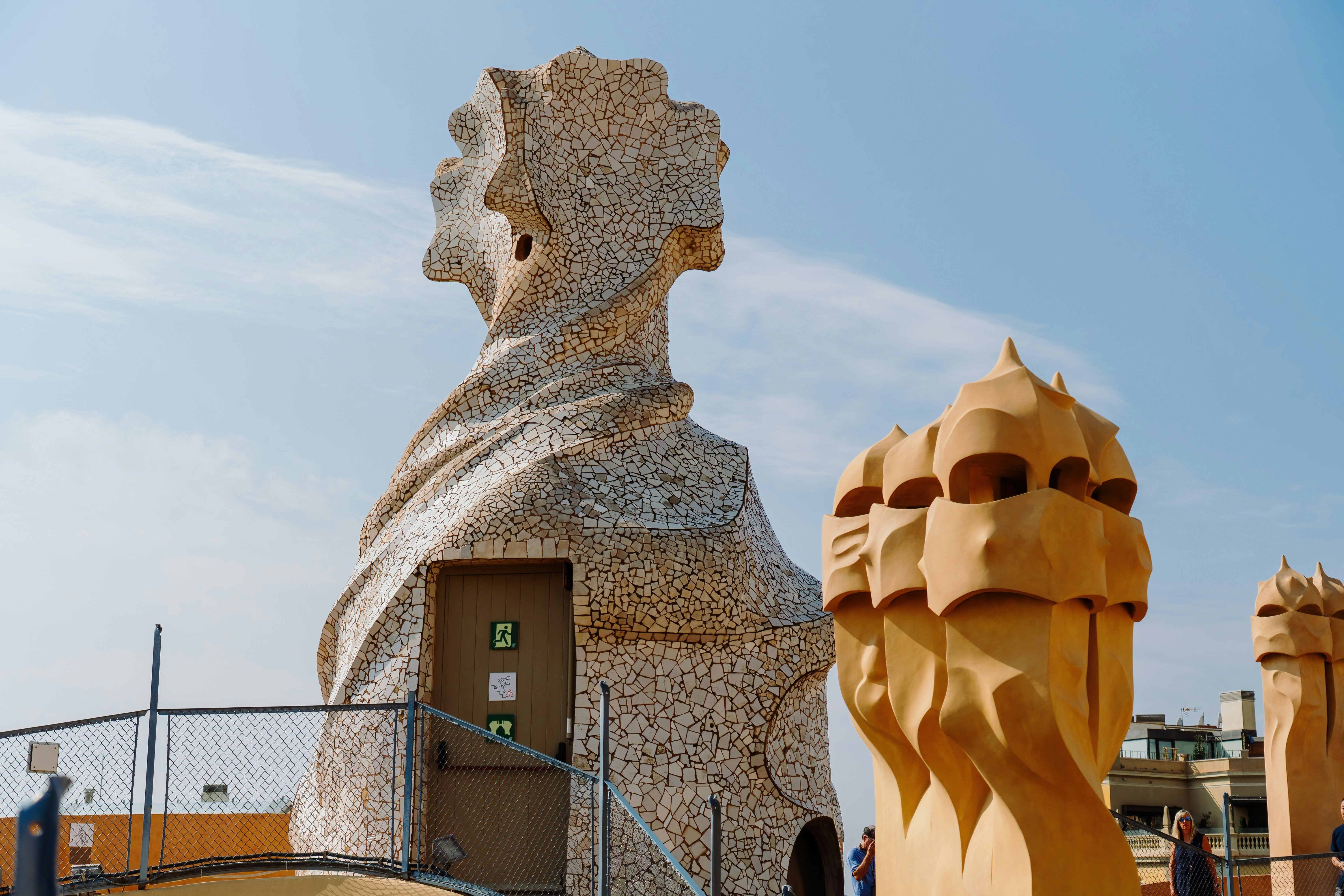 Wavy Facade Sentinel: A Rooftop Chorus of Sculpted Forms