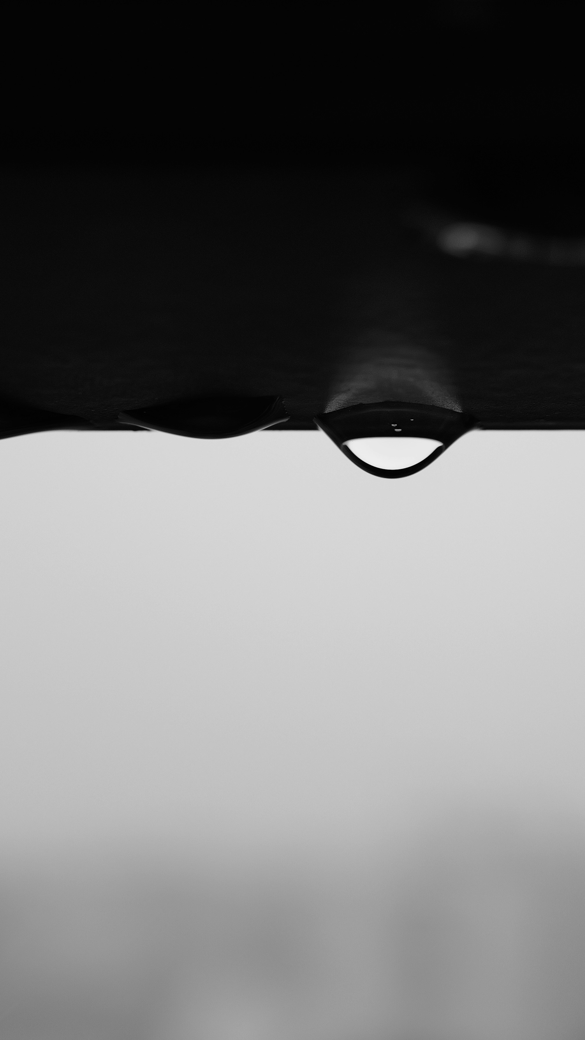 A Droplet on the Edge: Minimalist Black-and-White