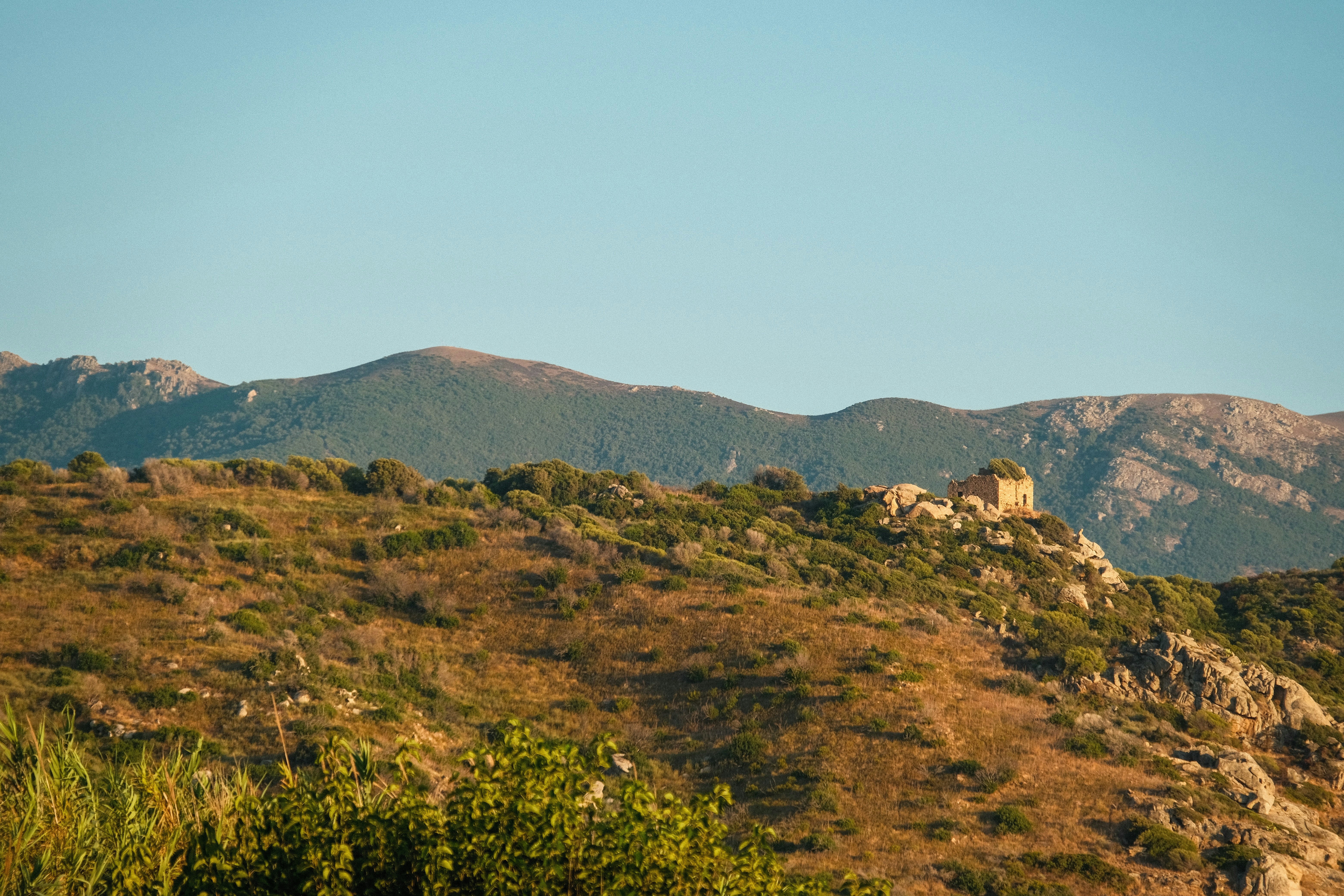A view of a mountain range from a distance photo – Free Liamone Image ...