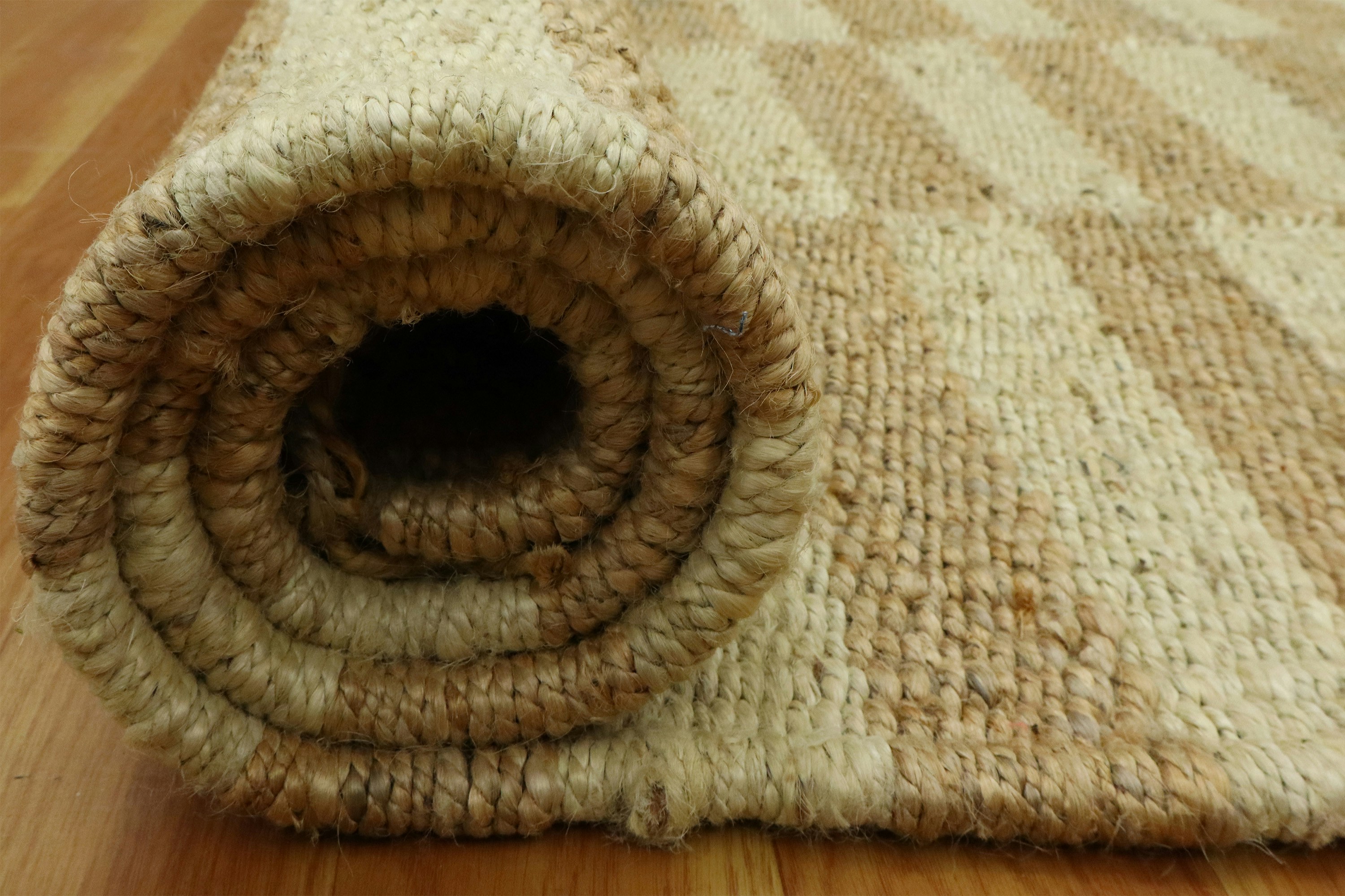 Nest of Natural Strands: Geometry in a Rolled Rug