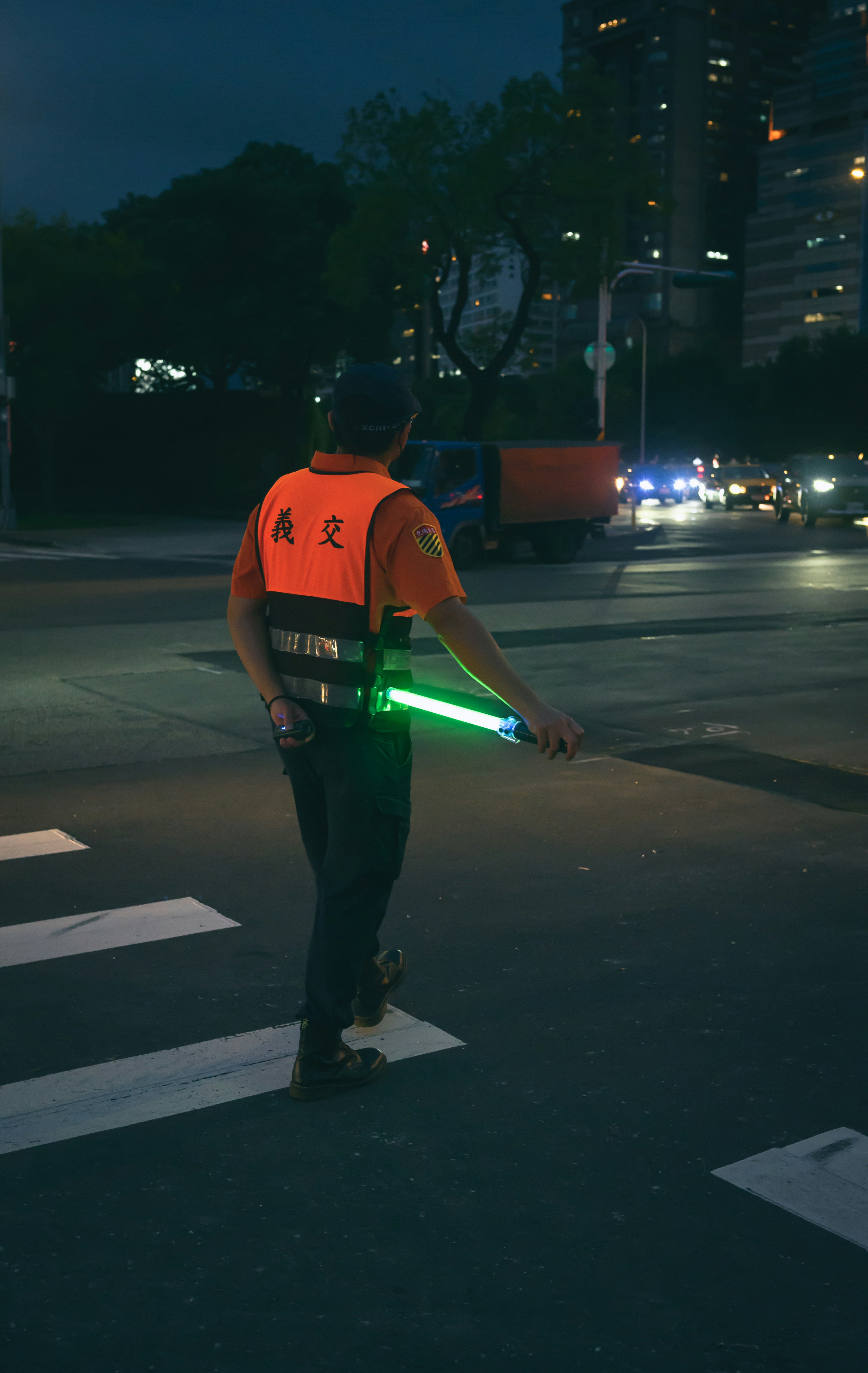 Crosswalk Sentinel: Night Shift with a Neon Green Baton