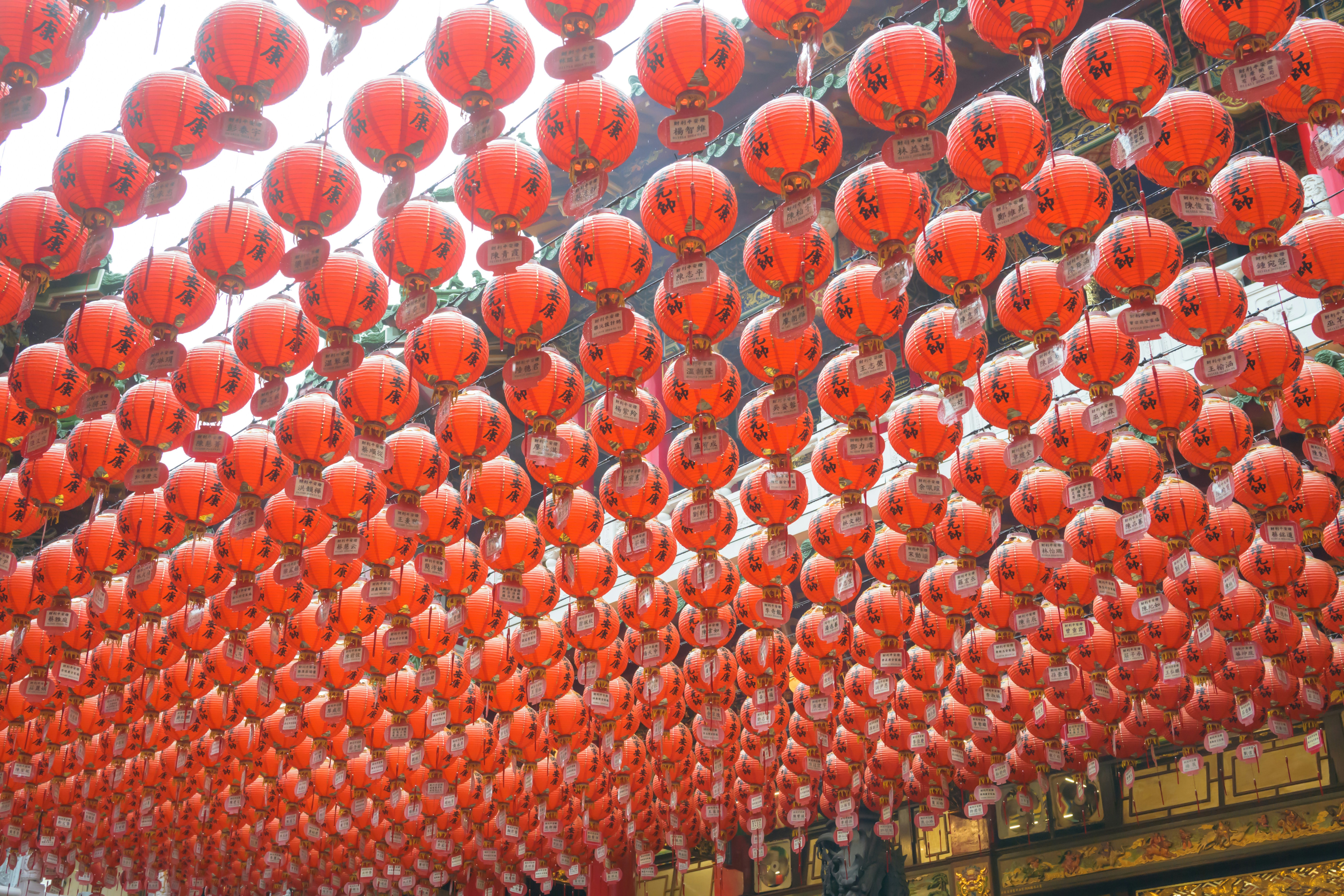 Crimson Lantern Canopy Over a Lantern-Laden Market Street