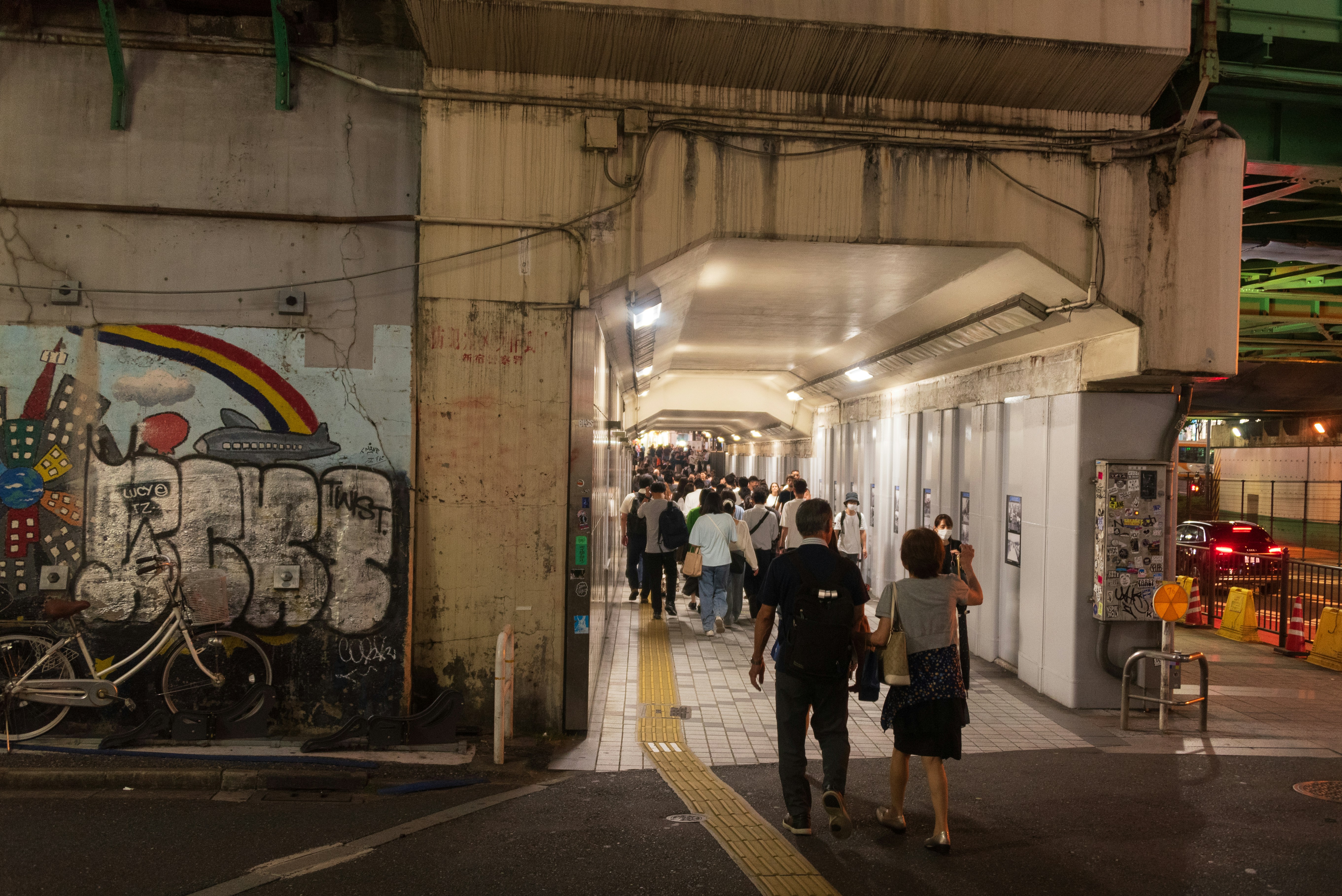 Urban Tapestry: Passage Through Tokyo's Underpass