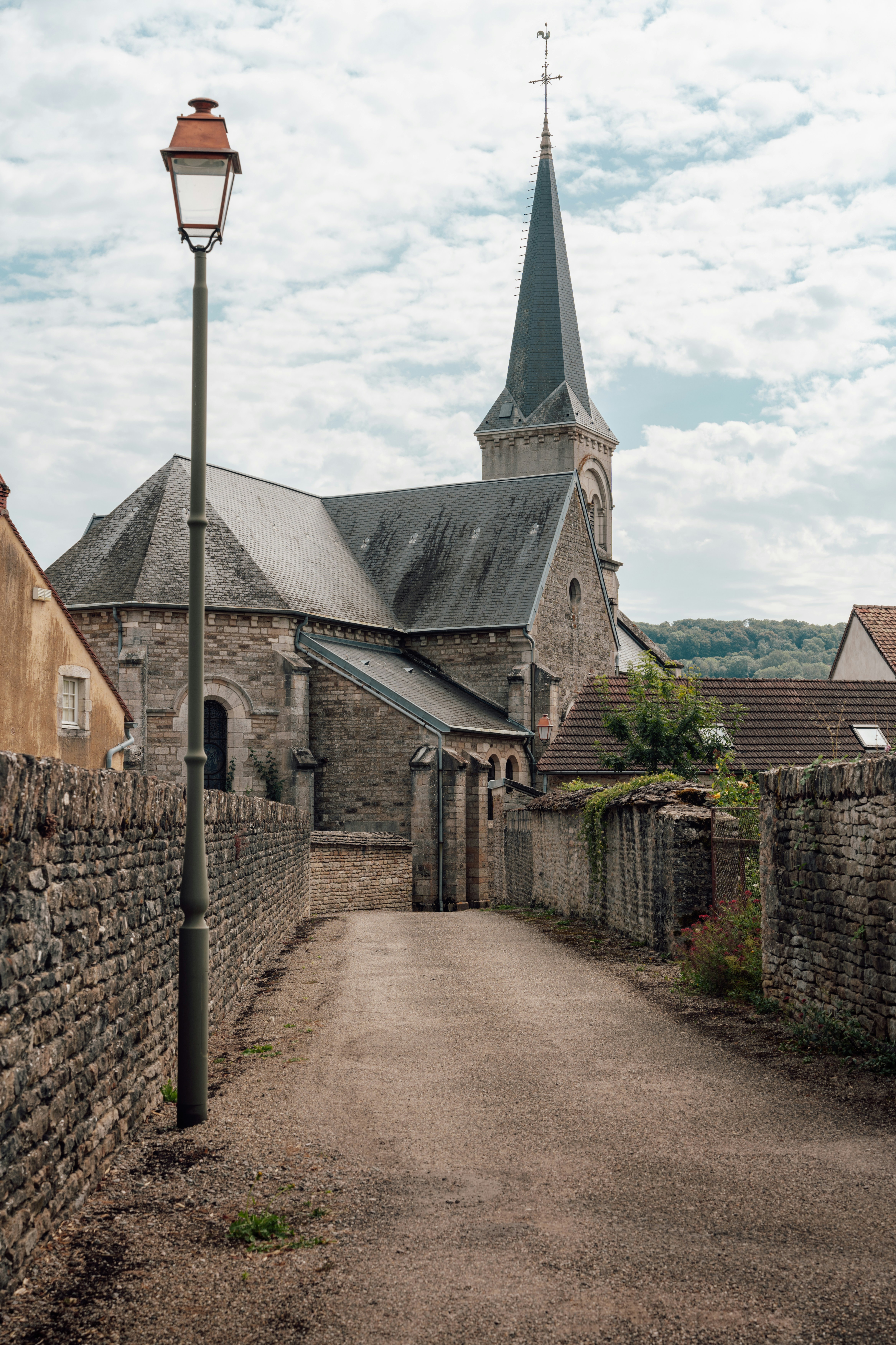 Cobbled Way to the Slate-Spired Church