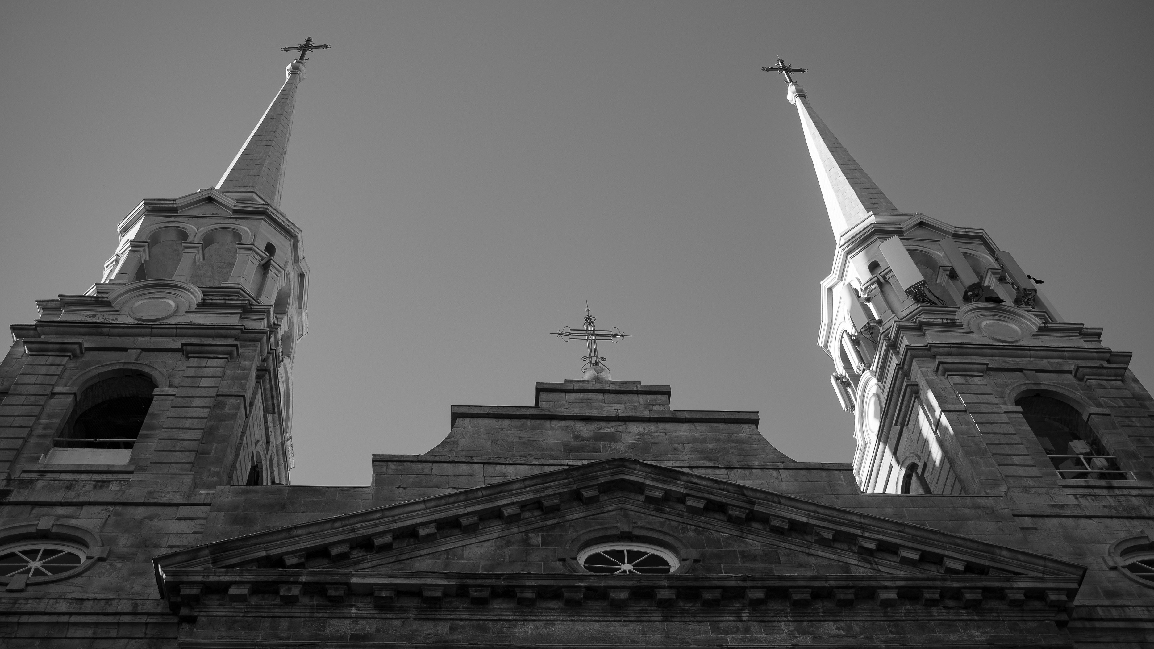 A black and white photo of two tall buildings photo – Free L'île-bizard ...